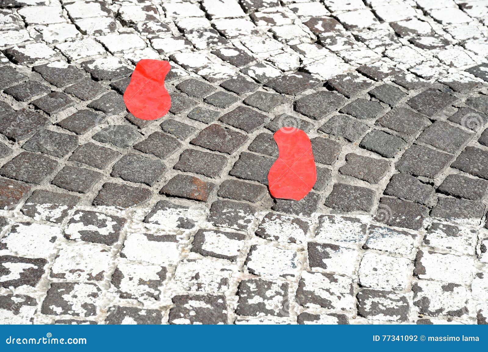 Red footsteps in town stock photo. Image of crosswalk - 77341092