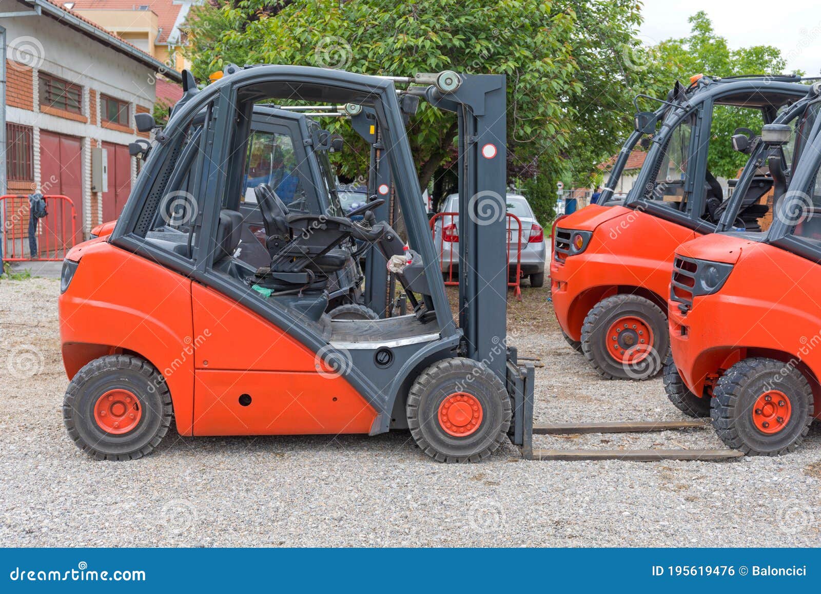 Red Forklift Trucks stock photo. Image of industrial - 195619476