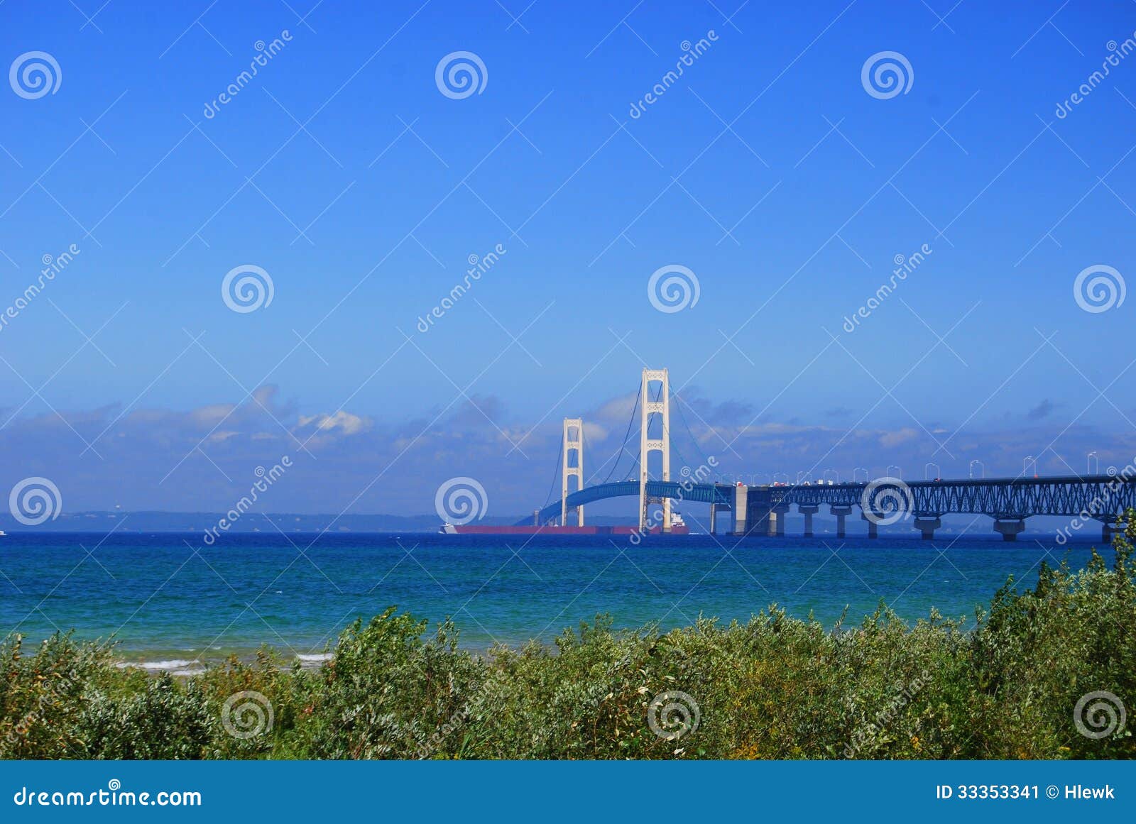 Red Freighter Under the Mighty Mackinac Bridge Stock Image - Image of ...