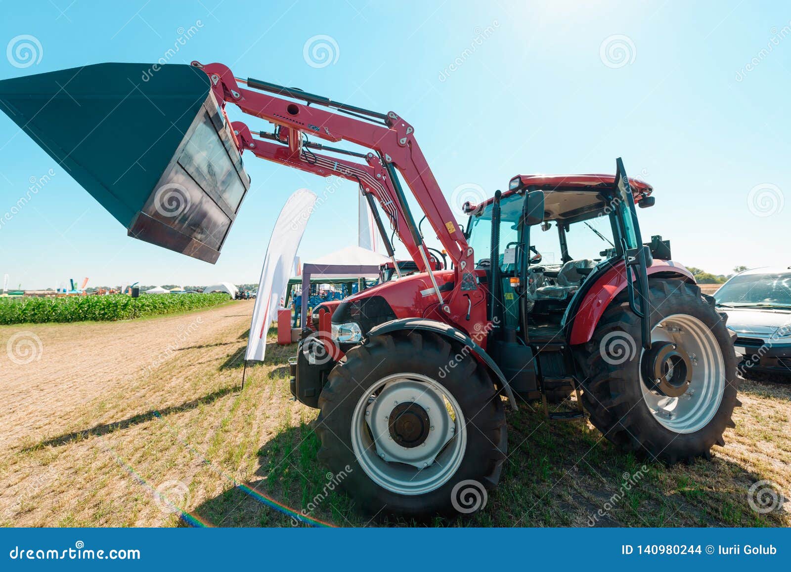 Red front-end loader stock photo. Image of fair, farming - 140980244