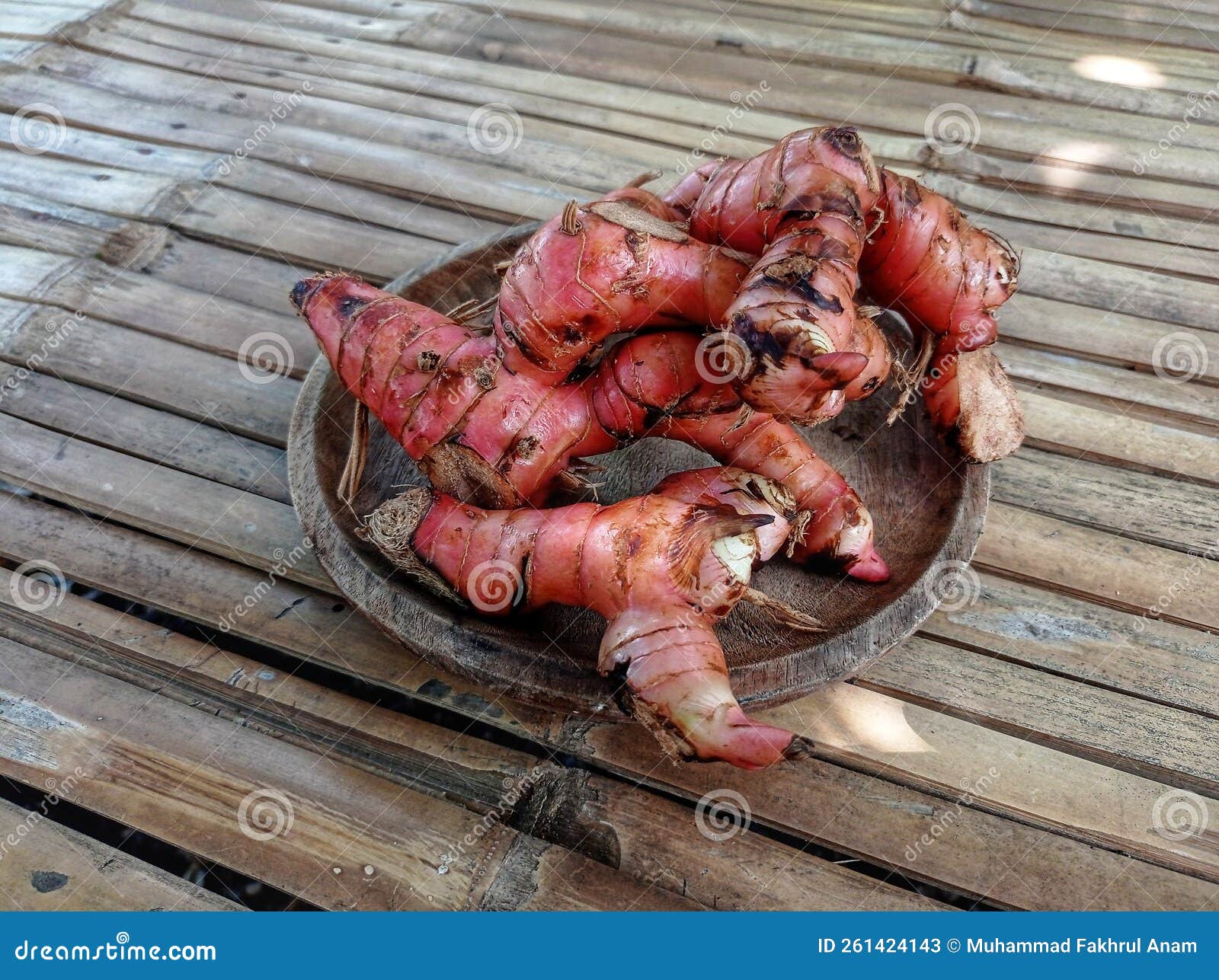 Red Galangal is Placed on a Wooden Mortar Stock Image - Image of ...