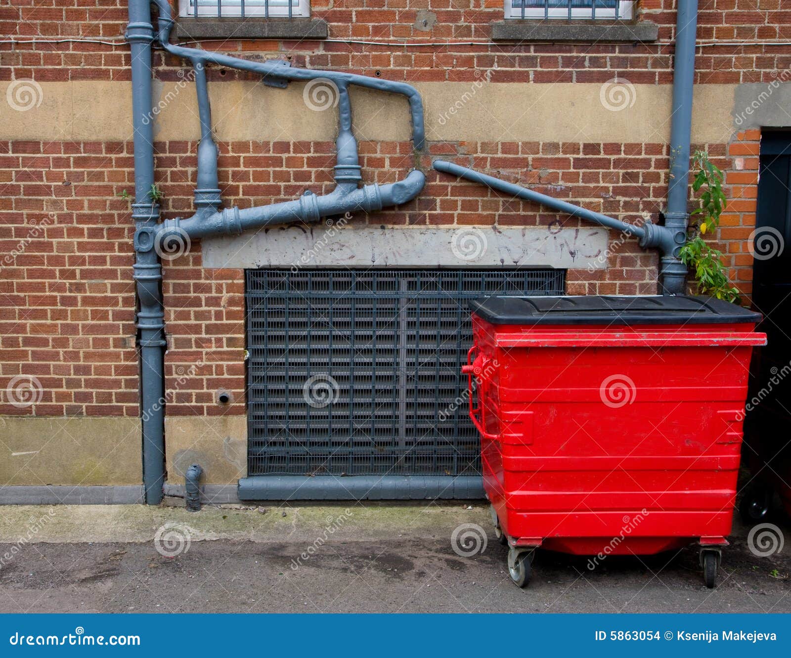 Red Garbage Bin and Outside Sewer Pipes Stock Photo - Image of sewerage ...