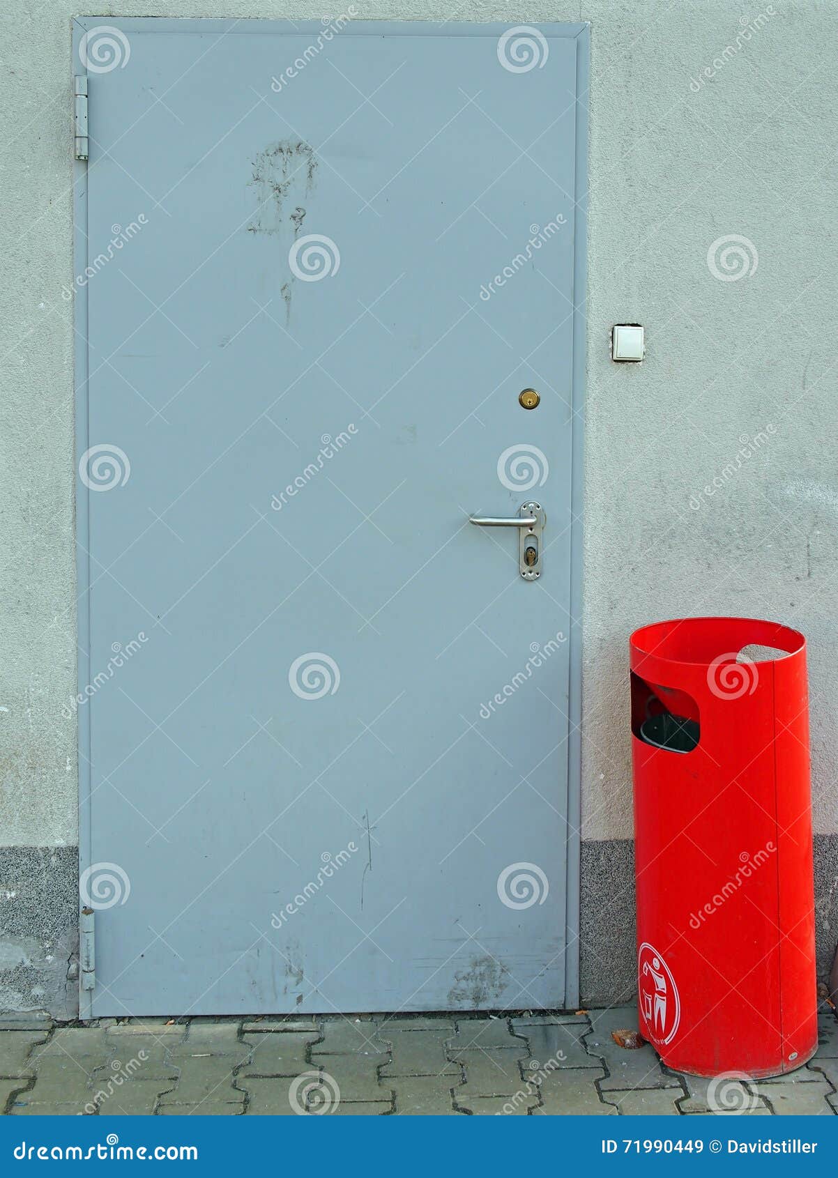 Red Garbage Can in Front of a Dirty Door Stock Image - Image of front ...
