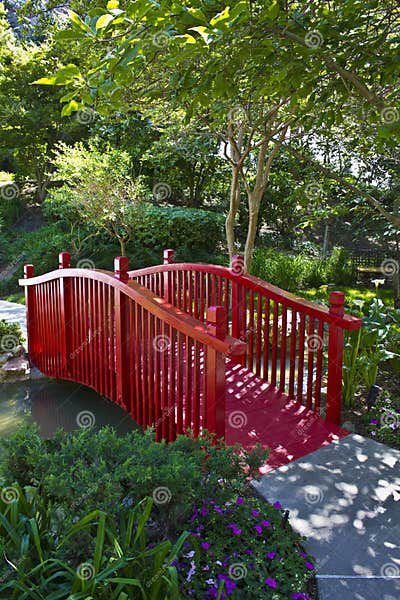 Red Garden Bridge stock image. Image of walking, flowers - 19400993