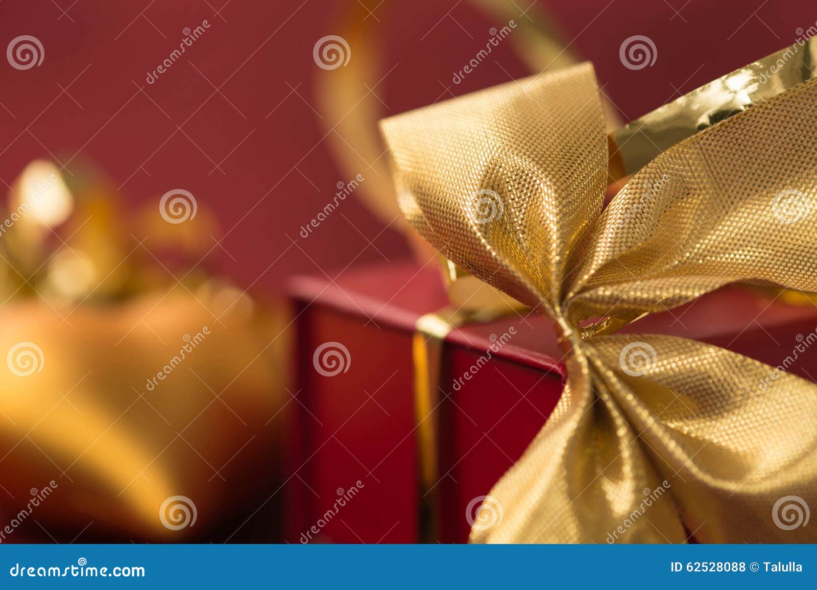Red Gift Box with Golden Bow Stock Photo - Image of ornament, decor ...