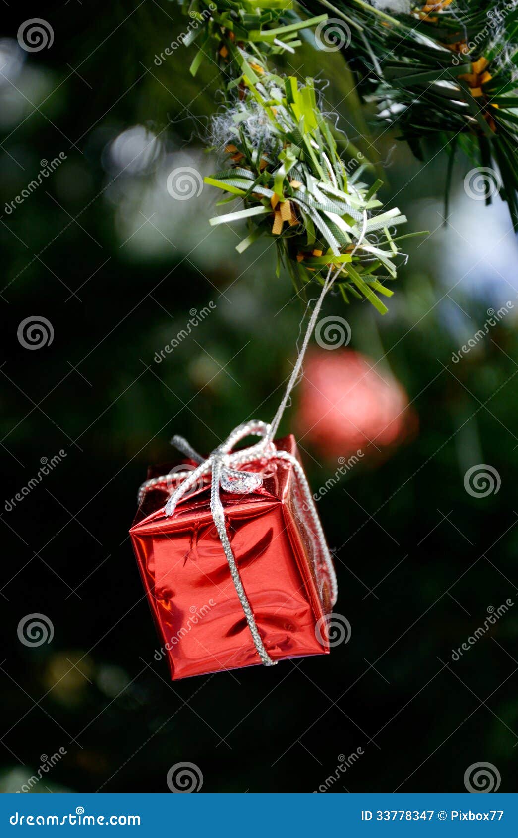 Red Gift Box Hanging on Christmas Tree Stock Image - Image of festive ...