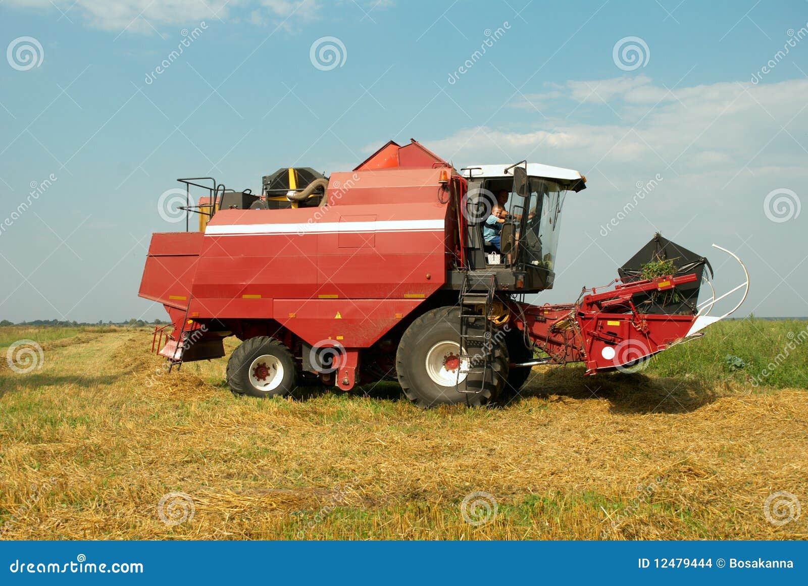 Red Grain Harvester Combine in a Field Stock Photo - Image of ...