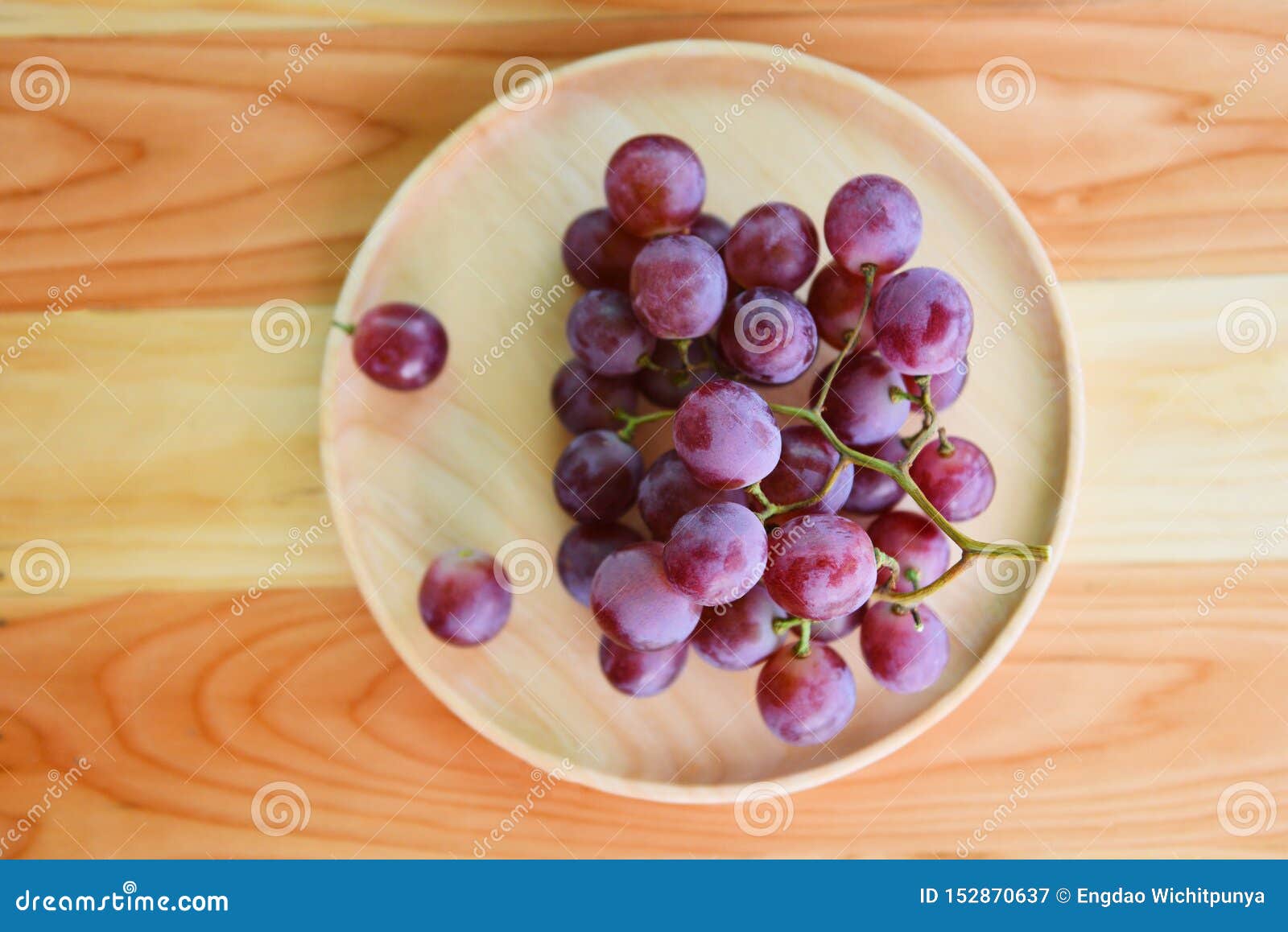 Red Grape Bunch on Wooden Plate on a Table Stock Image - Image of ...