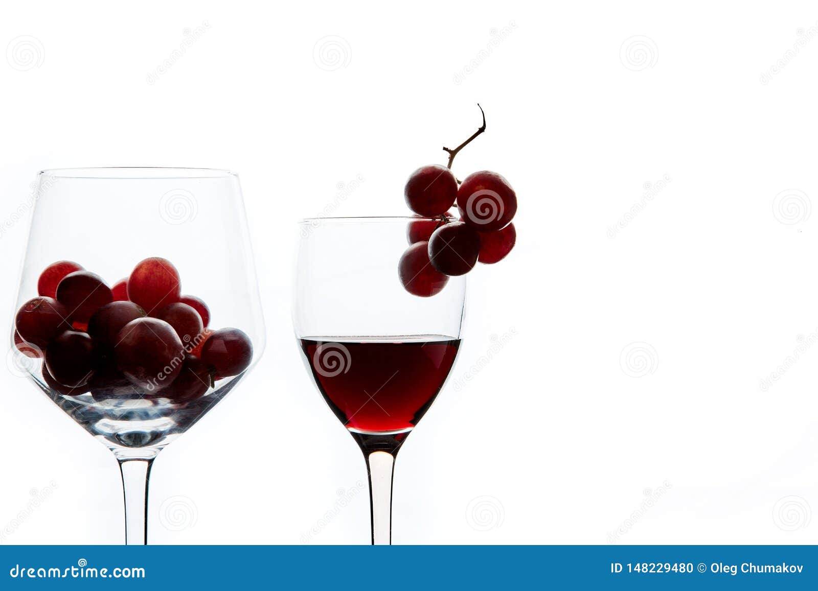Red Grape And Wine In Crystal Glasses On White Background Stock Photo ...