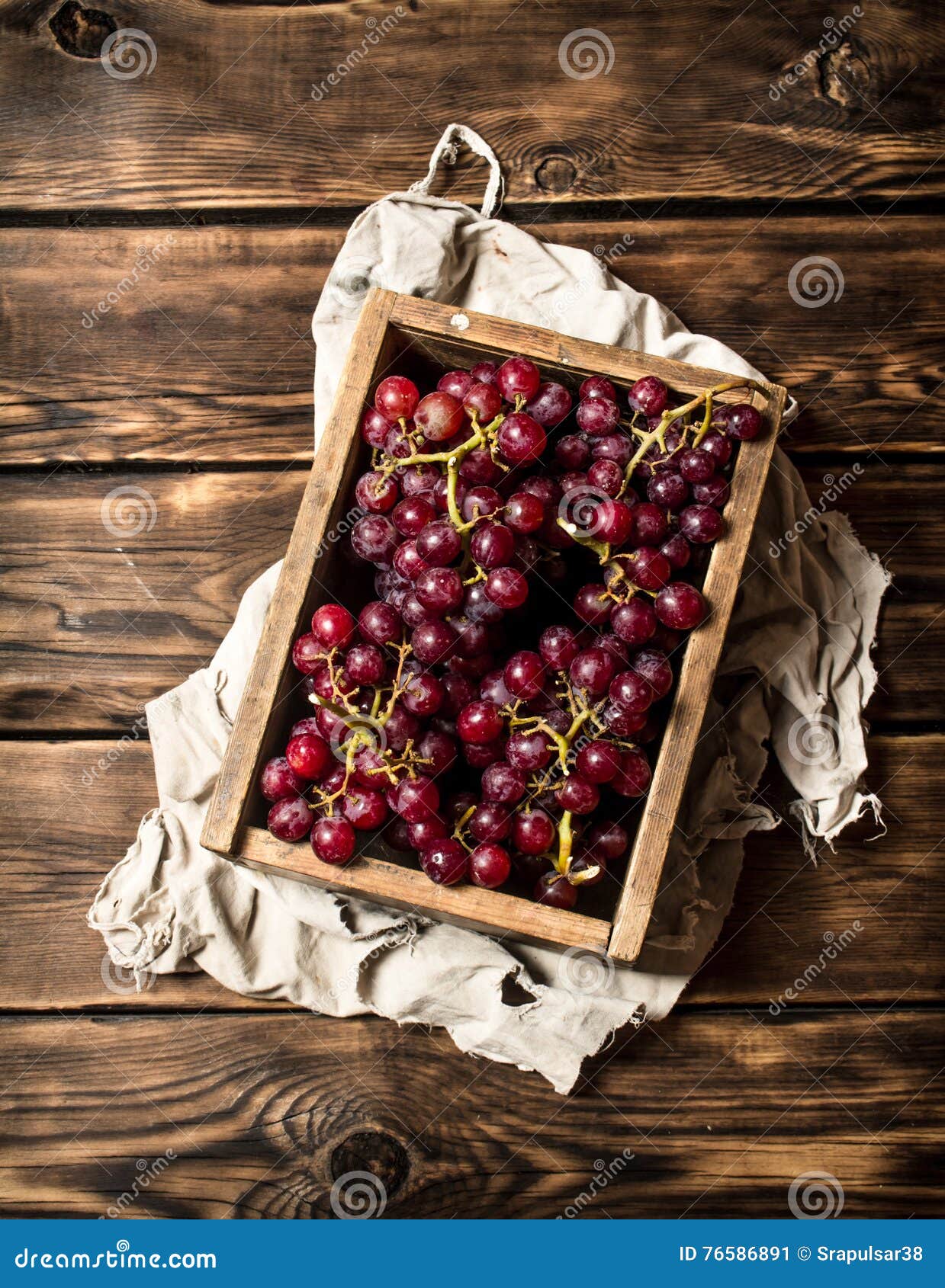 Red grapes in an old box. stock image. Image of health - 76586891