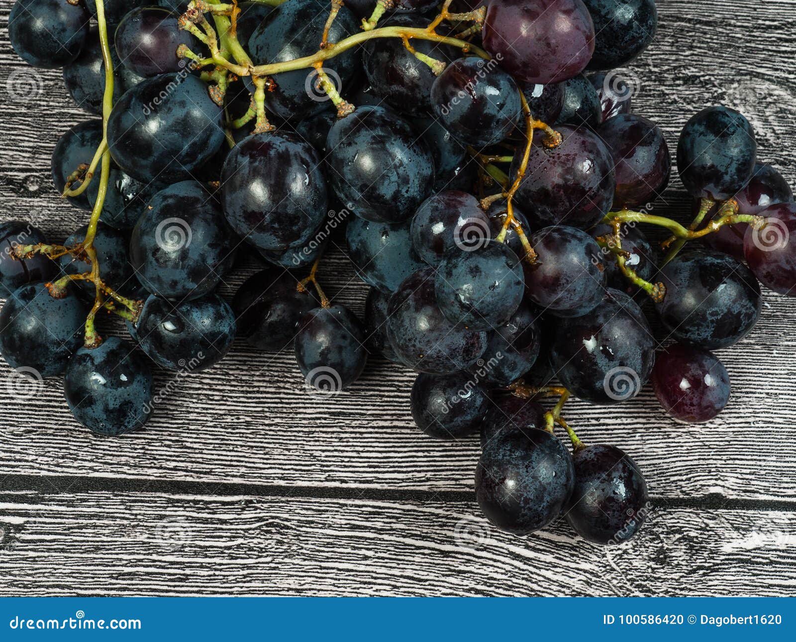 Red grapes on the table stock photo. Image of nature - 100586420
