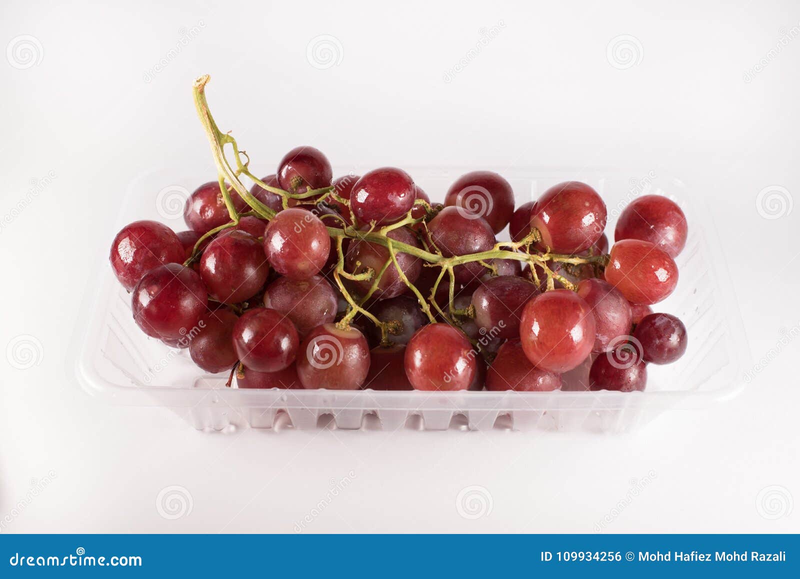 Red Grapes in Plastic Container Isolated on White Background Stock ...