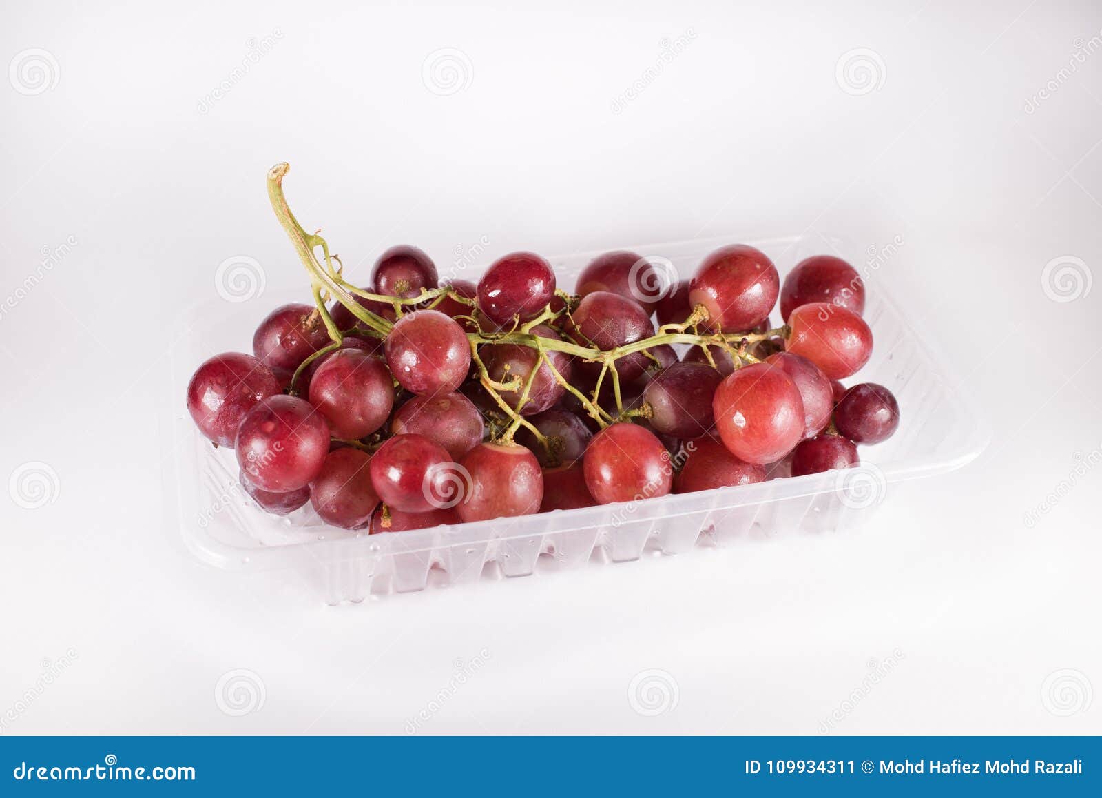 Red Grapes in Plastic Container Isolated on White Background Stock ...
