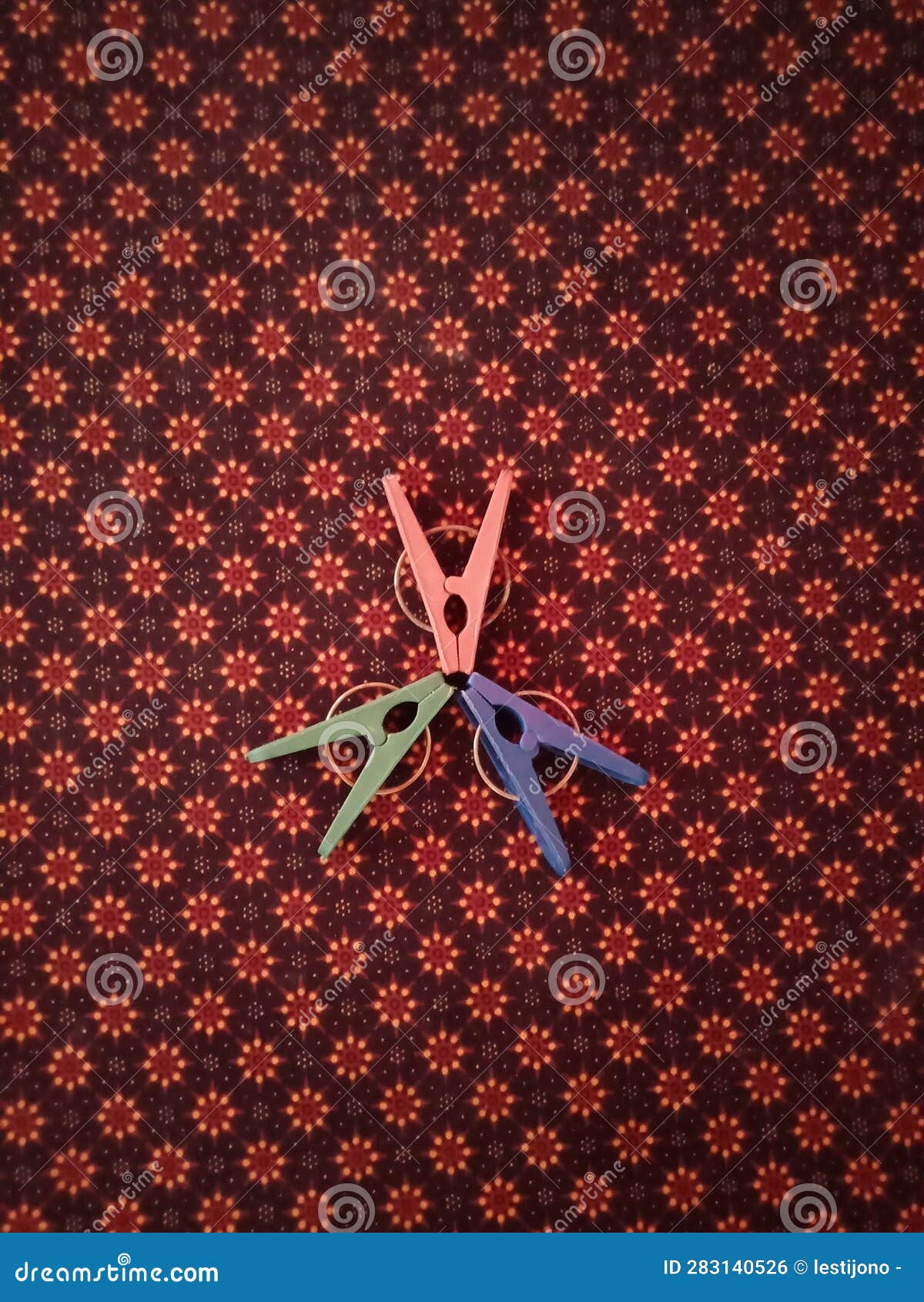 Red Green Blue Clothespins on Batik Indonesia Stock Photo - Image of ...