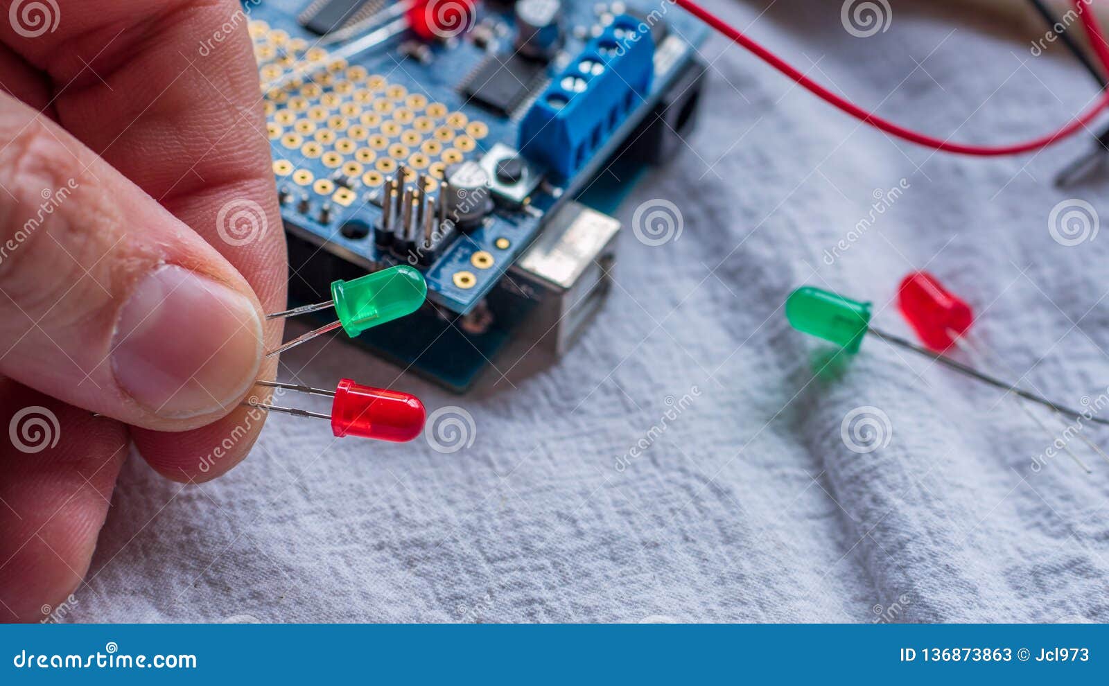 Red and Green LED Lights Being Shown in Use As Part of a ...