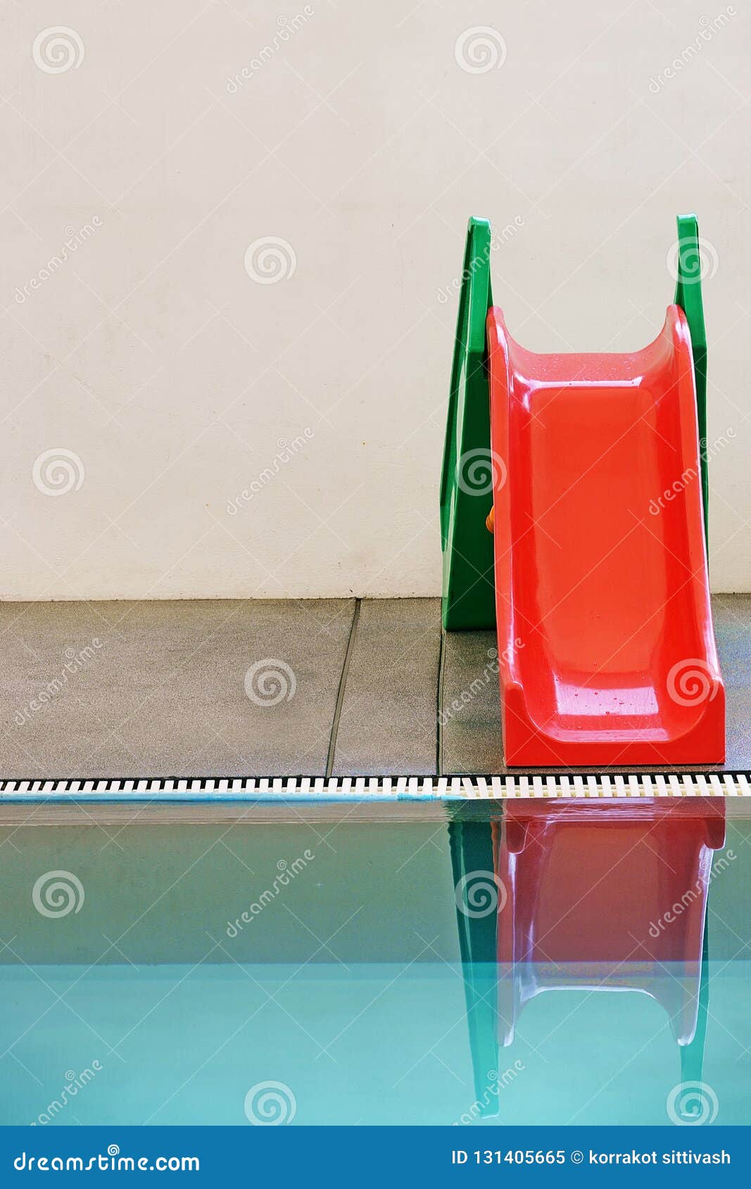 Red , Green, Water Slider in Swimming Pool Stock Image - Image of ...