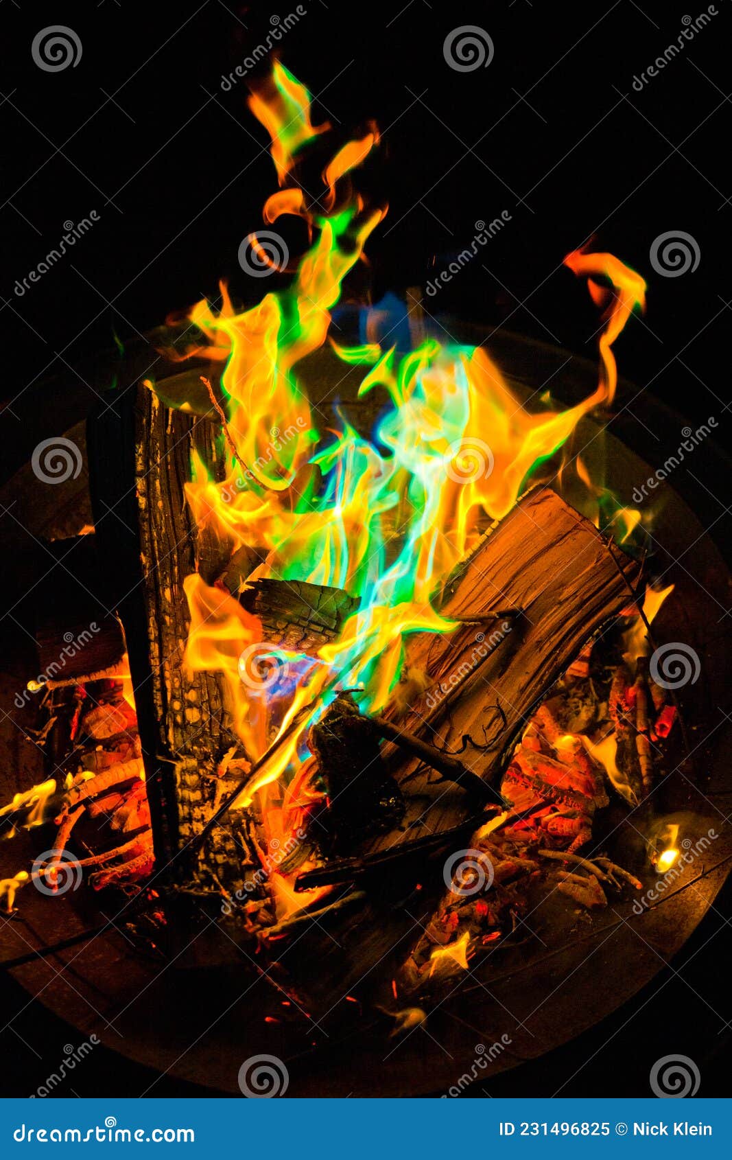 Red Green and Yellow Flames Rage in a Fire Pit Stock Image - Image of ...