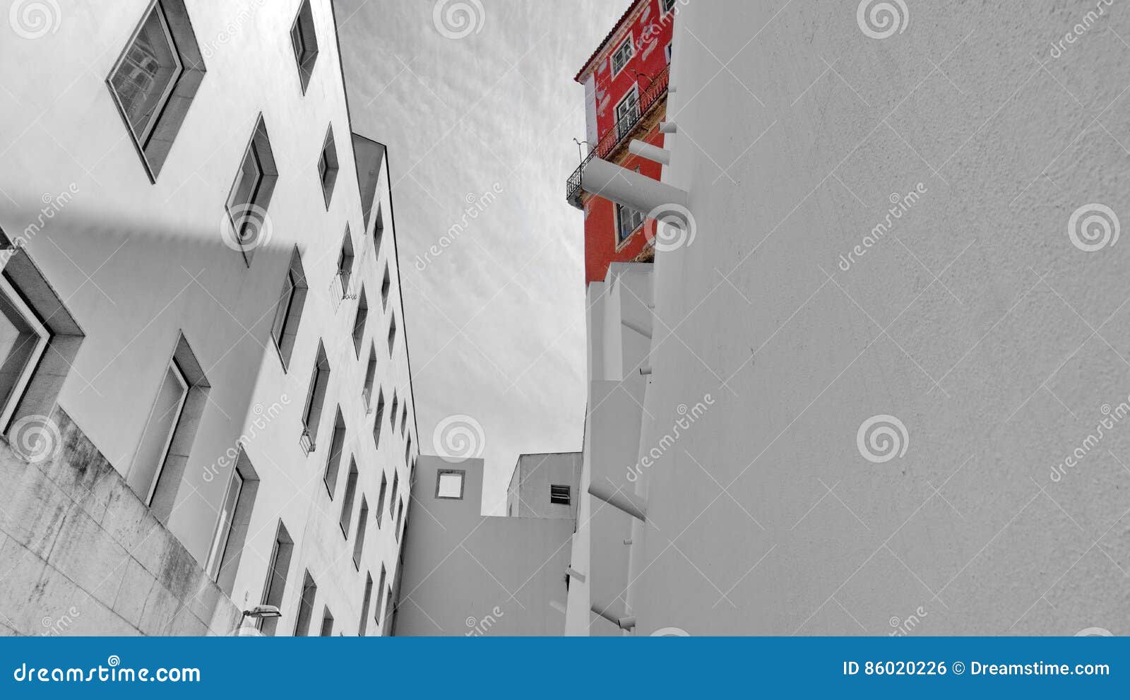 Red on grey building stock photo. Image of real, modern - 86020226