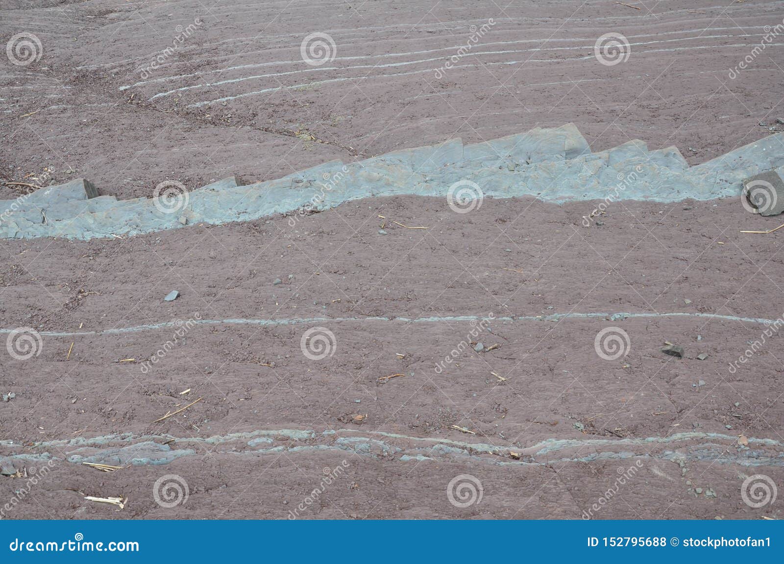 Red and Grey Rock Layers or Strata on the Ground Stock Photo - Image of ...