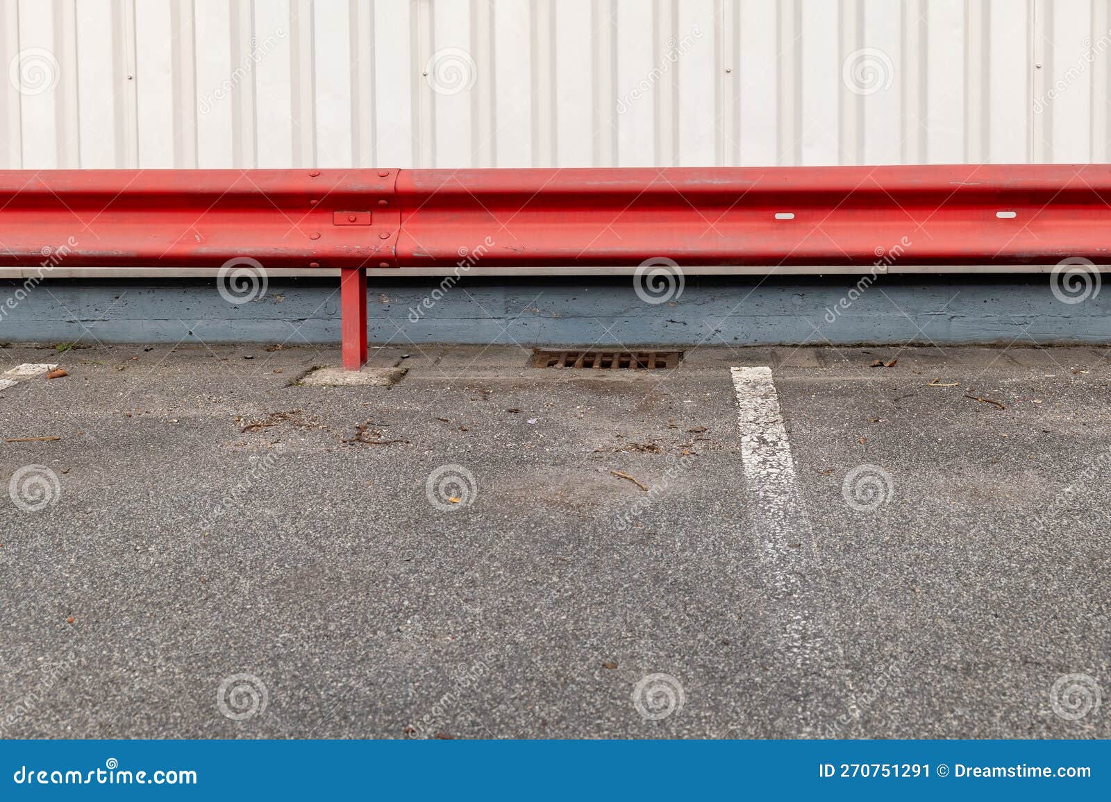 Red Guardrail in a Parking Lot Stock Image - Image of stop, control ...