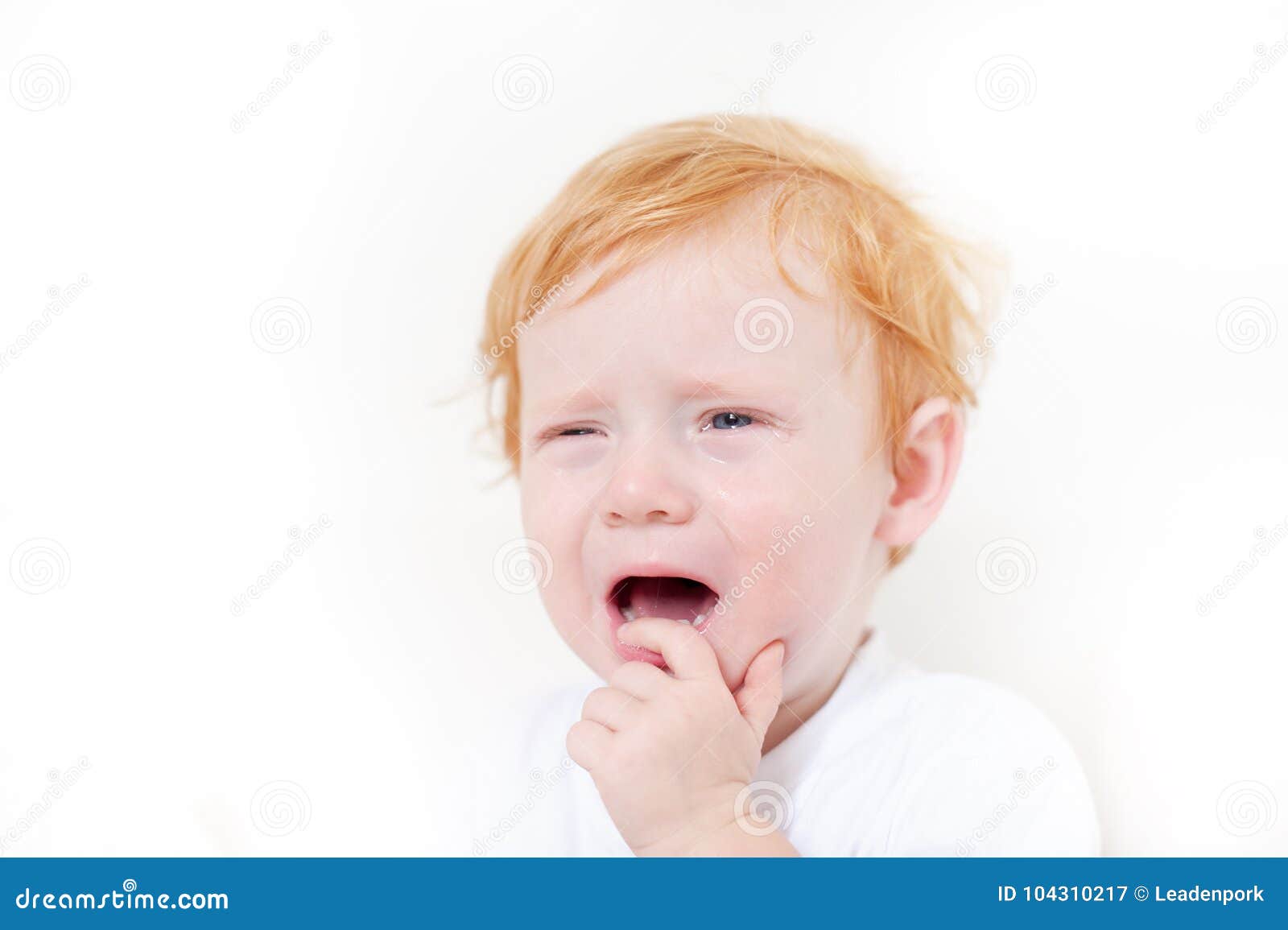 A red-haired boy is crying stock image. Image of white - 104310217