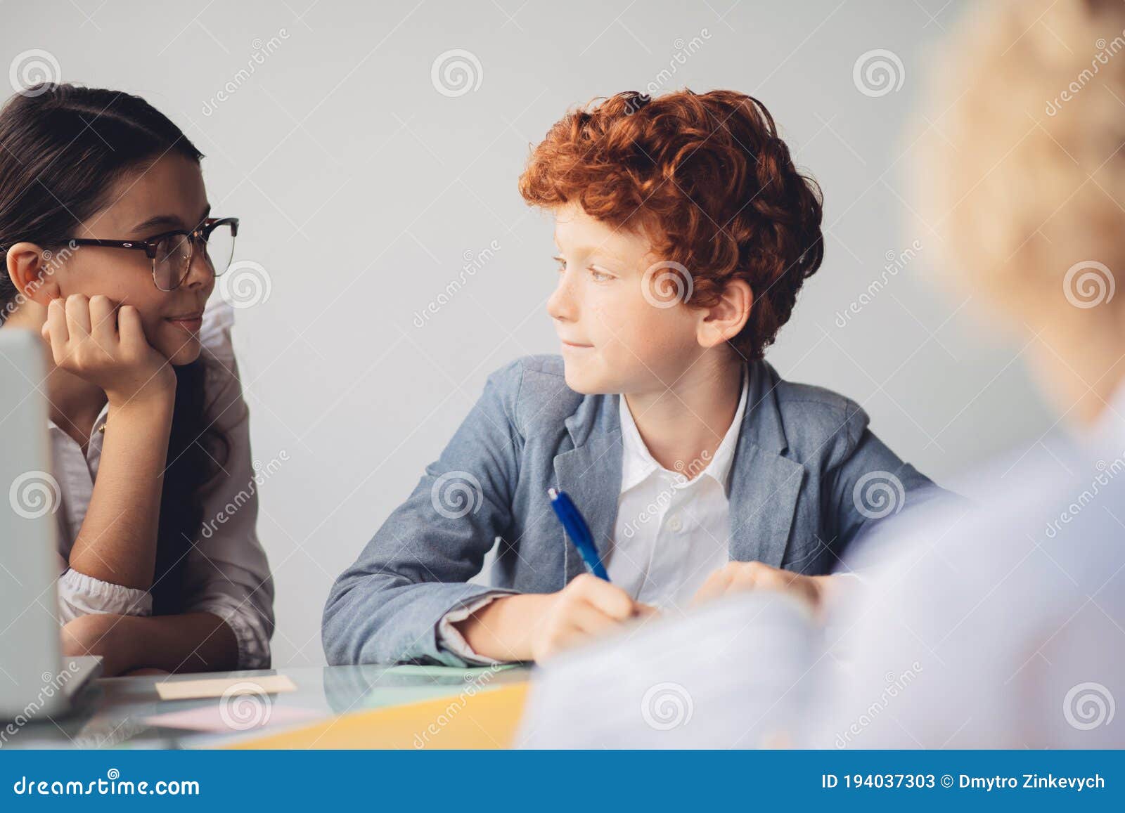Red-haired Boy Studying with His Friend and Looking Attentive Stock ...