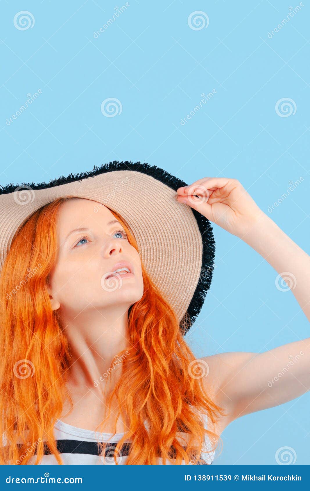 Red Haired Girl Holds Hands Straw Hat And Looks Up Stock Image Image