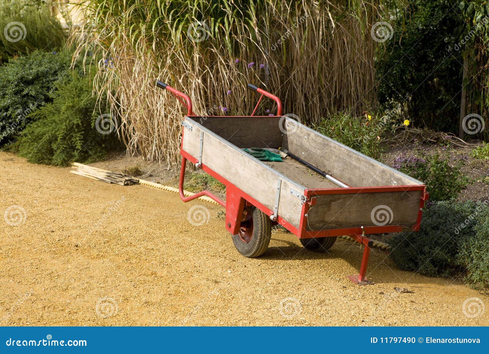 Red Handbarrow in the Garden Stock Photo - Image of funny, barrow: 11797490