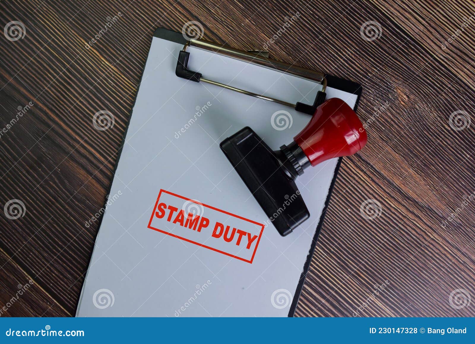 Red Handle Rubber Stamper and Stamp Duty Text Isolated on Wooden Table ...