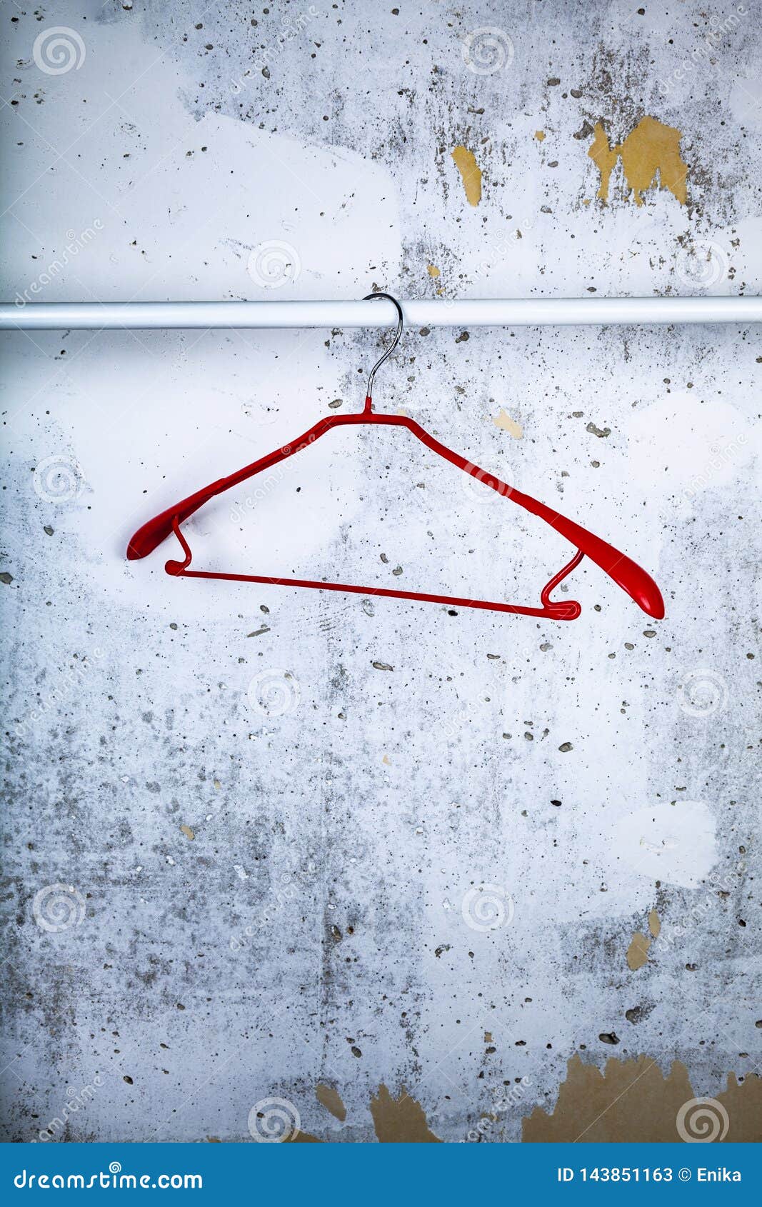 Red hanger on a gray wall stock image. Image of household - 143851163