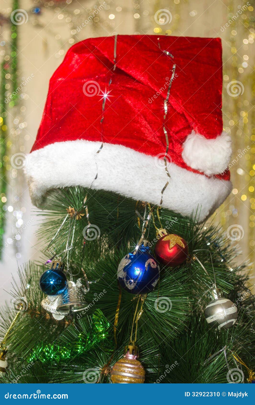 Red Hat on a Christmas Tree Stock Photo - Image of artificial, season ...