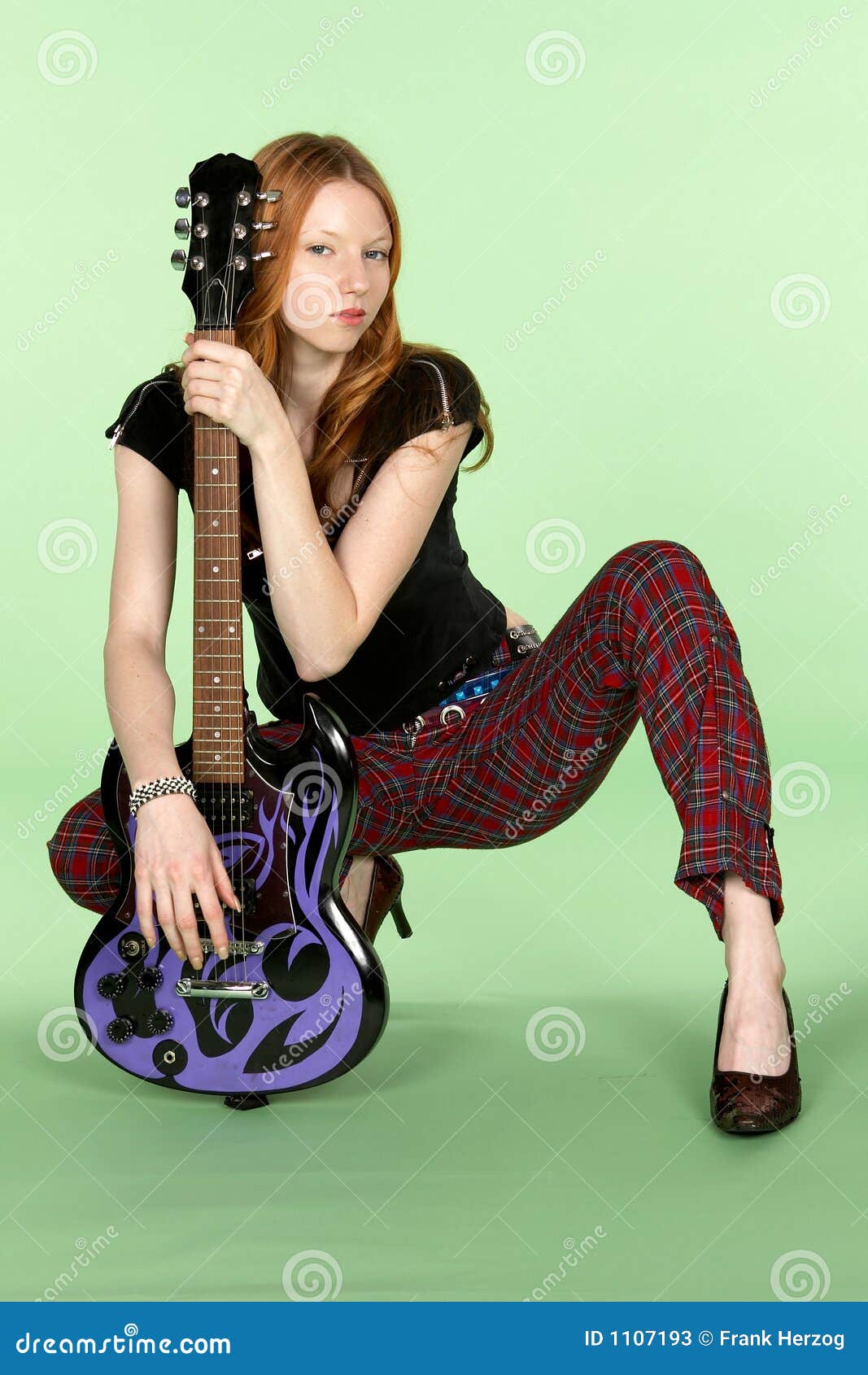 Red Head Rock and Roll Guitar Player Squating Stock Image - Image of ...