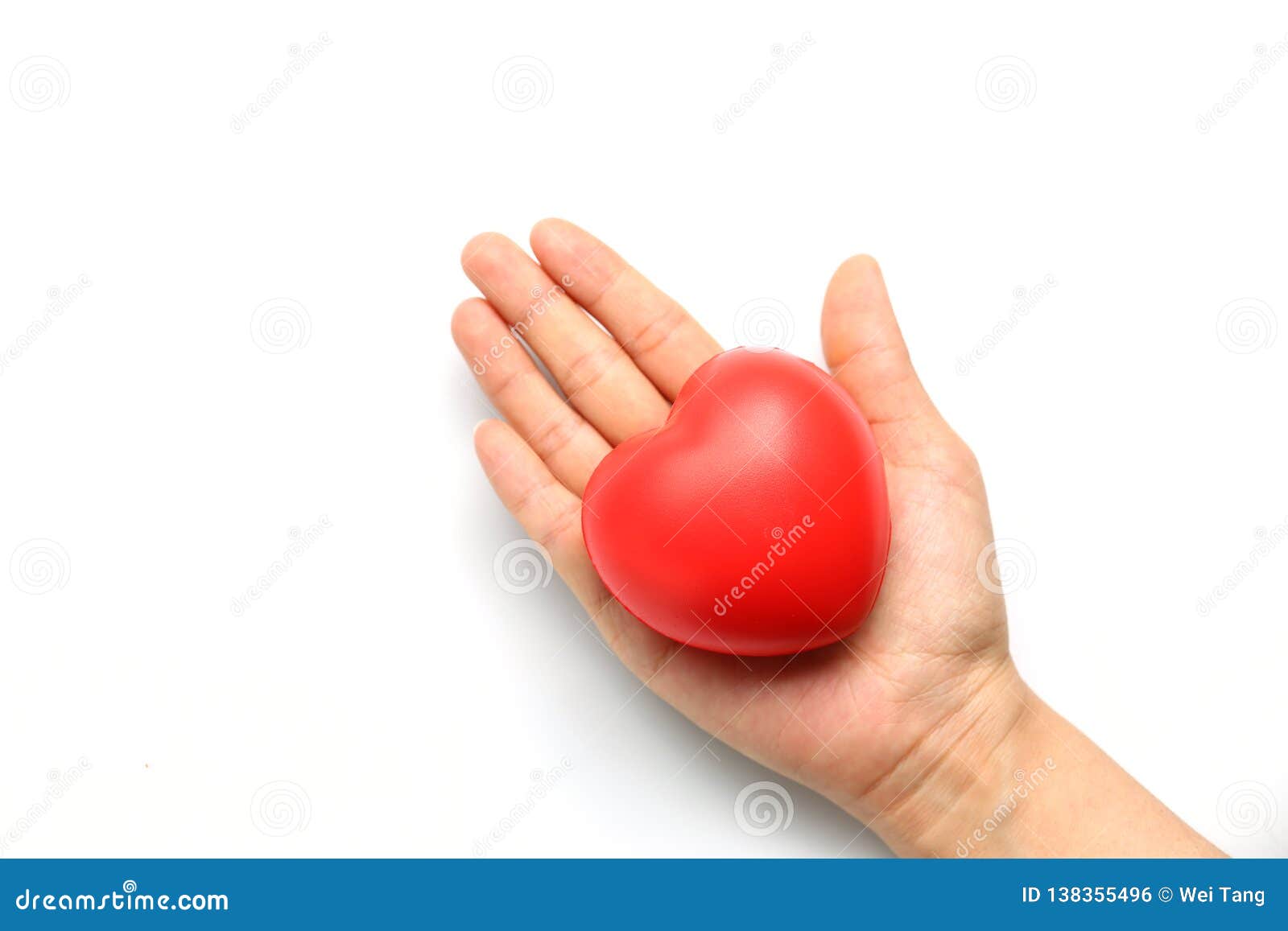 Red heart in hands stock photo. Image of feeling, health - 138355496