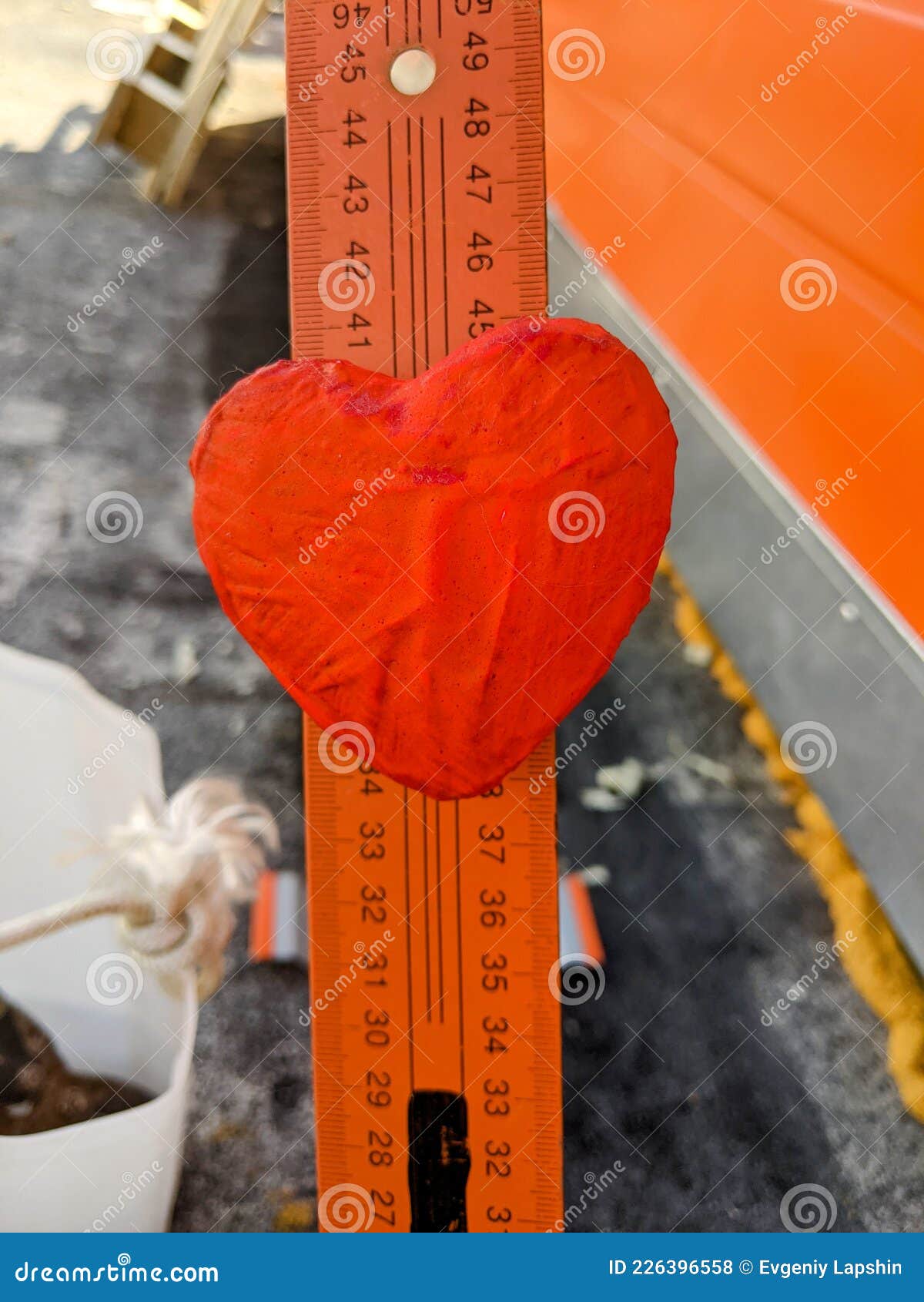 Red Heart Hanging on a Construction Tool Stock Photo - Image of ...