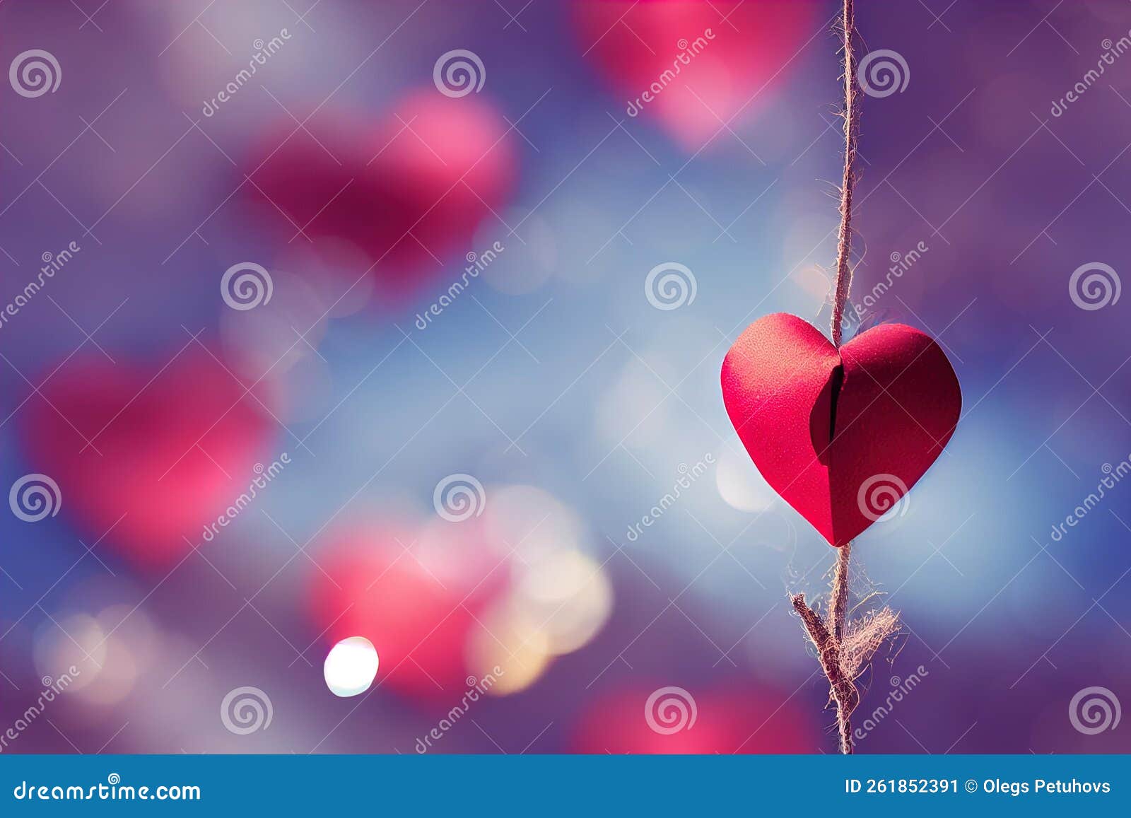 A Red Heart Hanging from a String on a String with a Blue Sky in the ...
