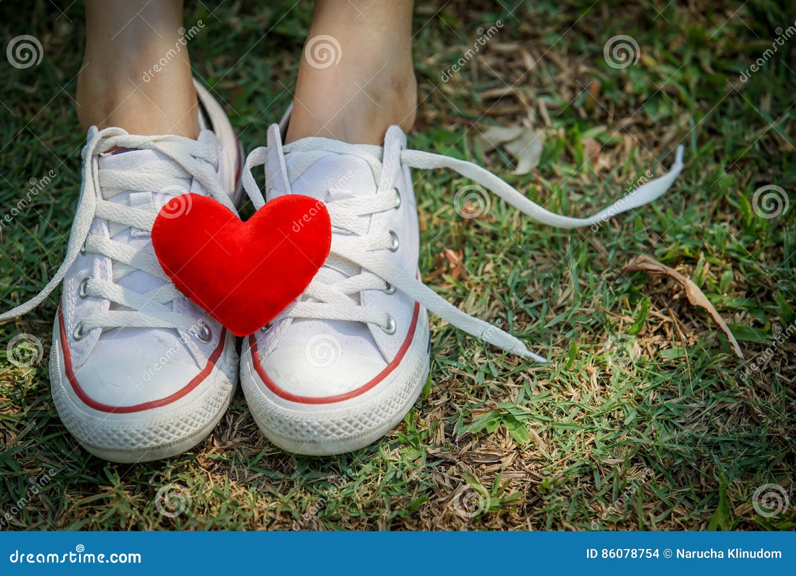 Red heart on human foot stock photo. Image of motion - 86078754