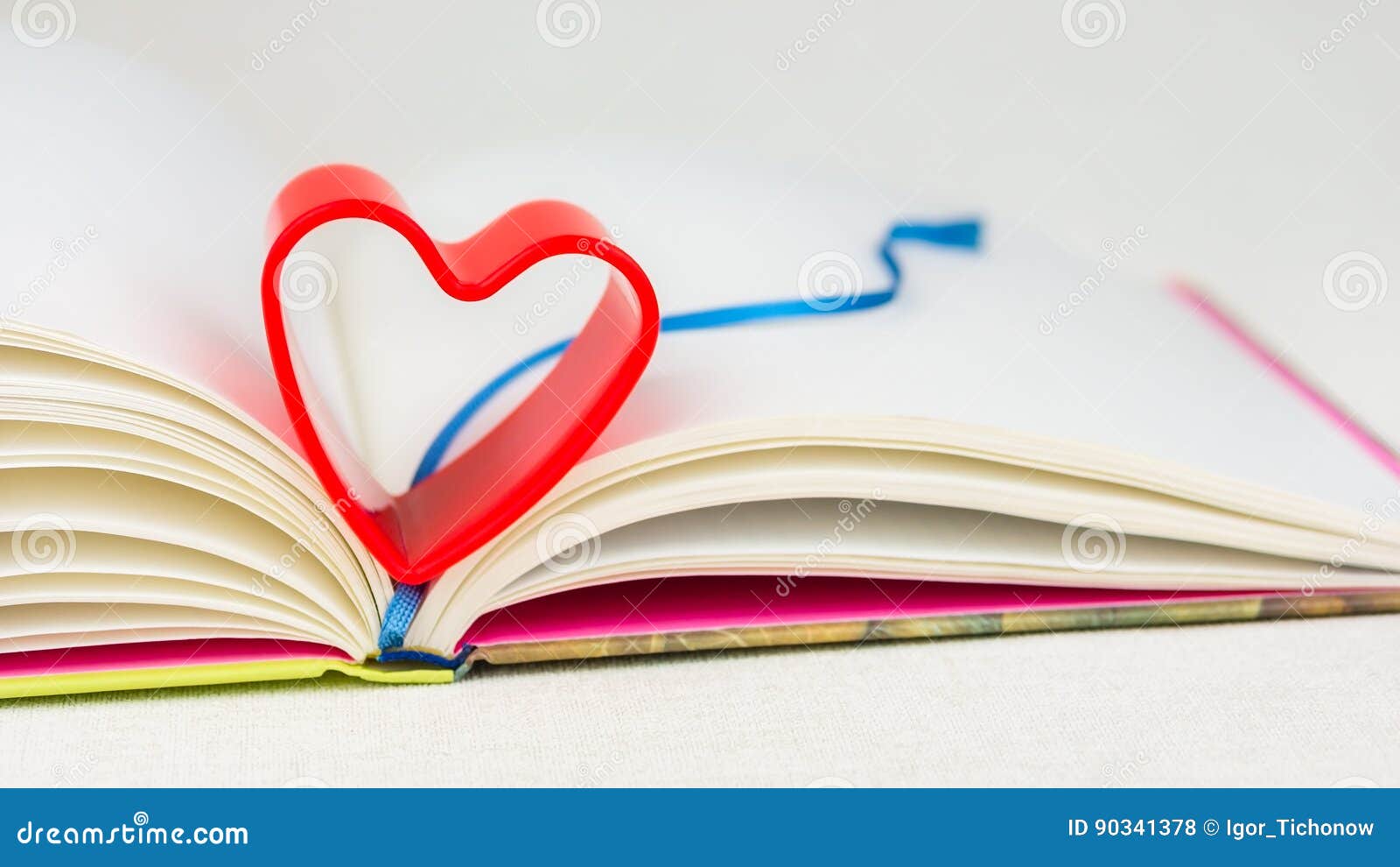 Red Heart Over Diary Book with Bookmark on White Table Stock Photo ...