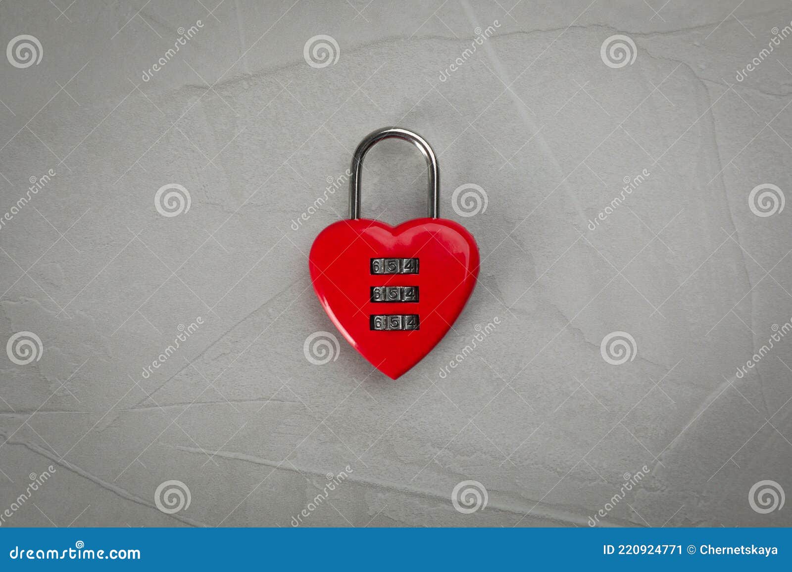 Red Heart Shaped Combination Lock on Light Grey Table, Top View Stock ...