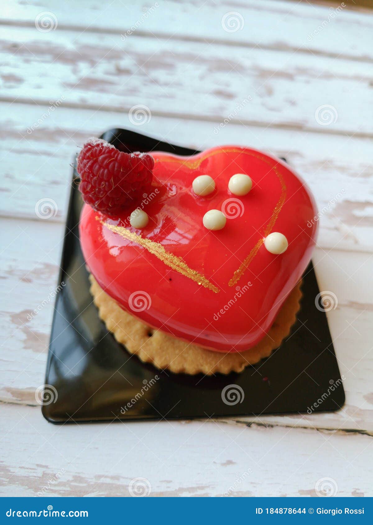 Red Heart-shaped Pastry with Biscuit and Raspberry Stock Photo - Image ...