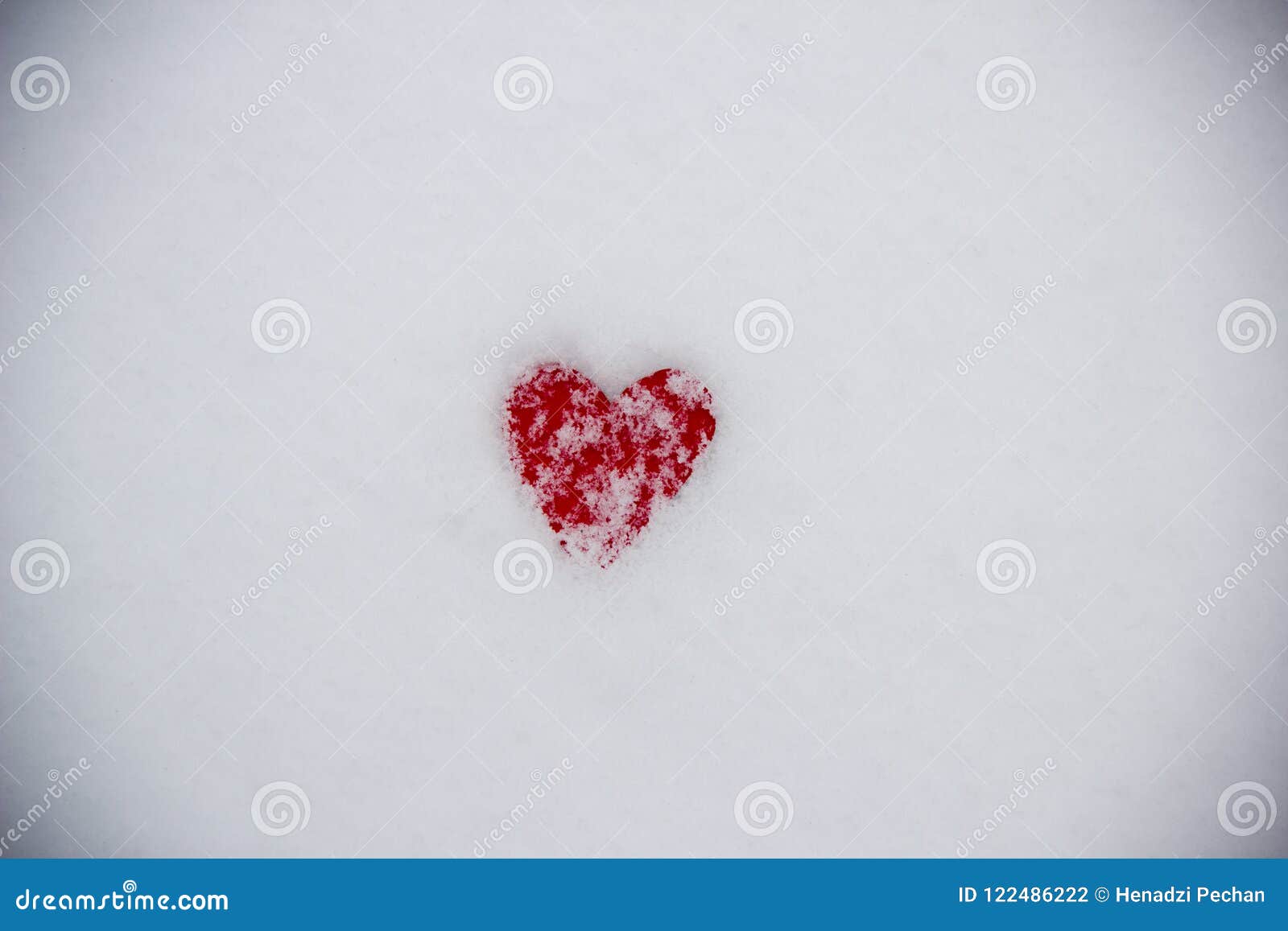 Red Heart in the Snow Symbol Stock Photo - Image of mittens, romance ...