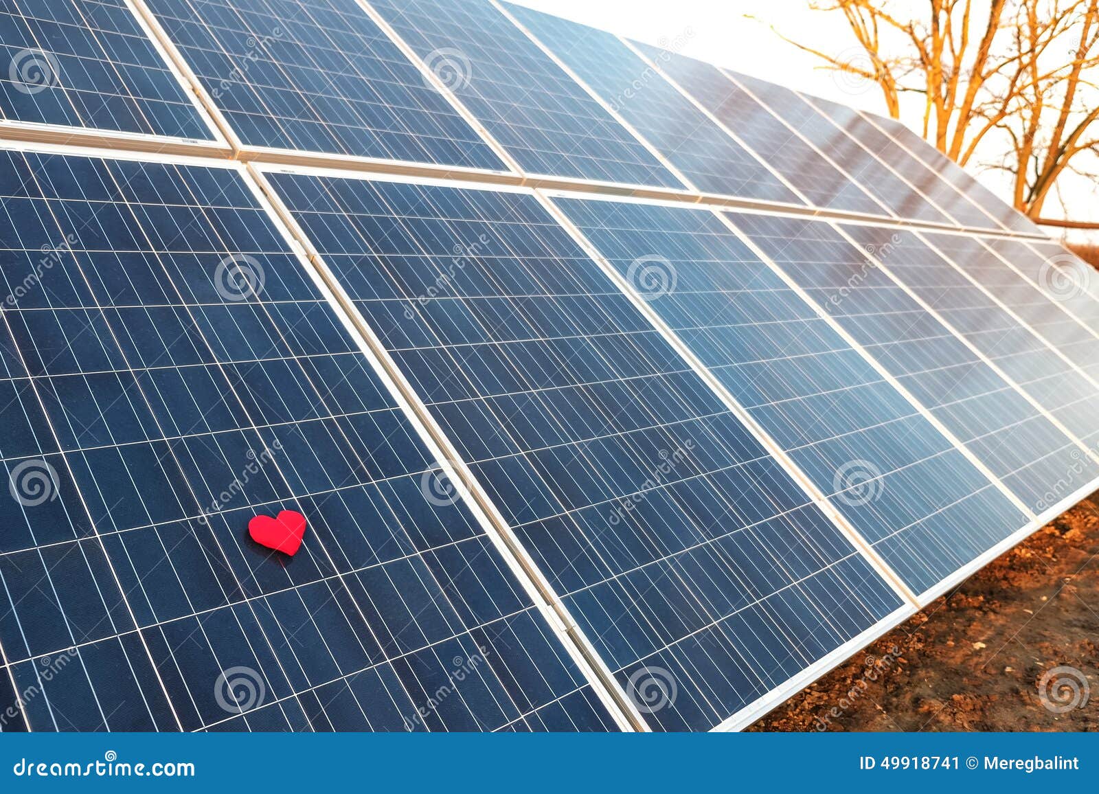 Red heart on a solar panel stock image. Image of alternative - 49918741