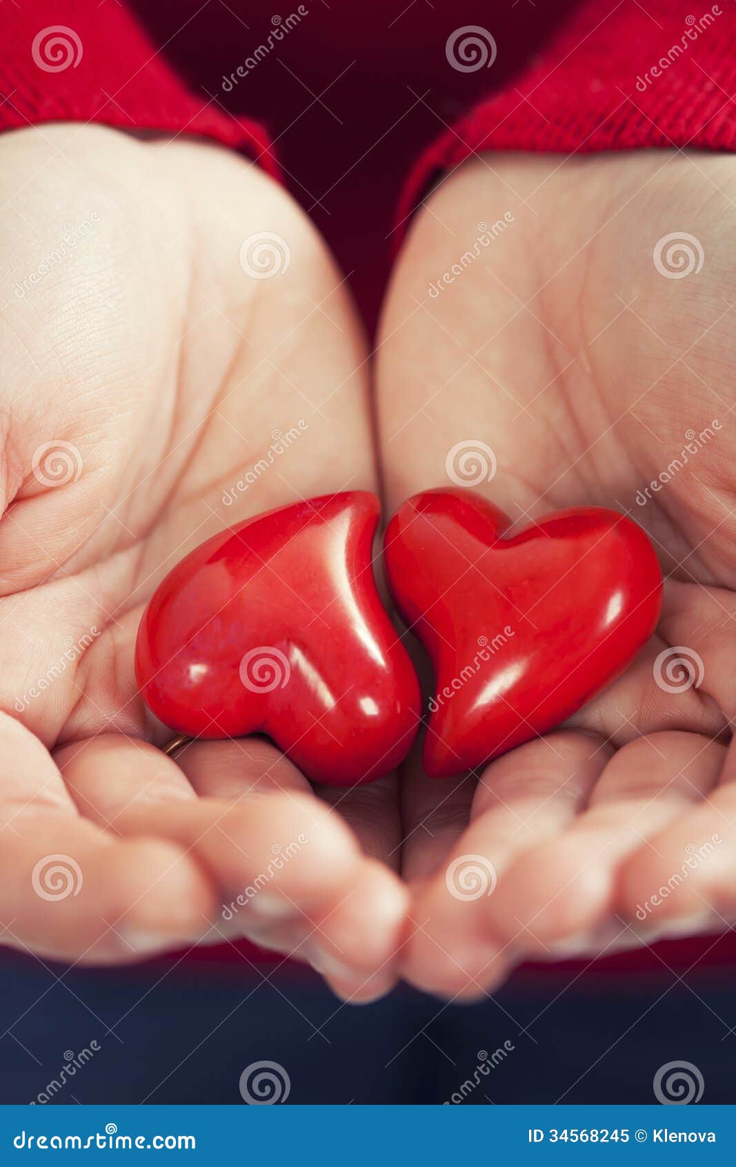 Red hearts in hands stock image. Image of heart, design - 34568245