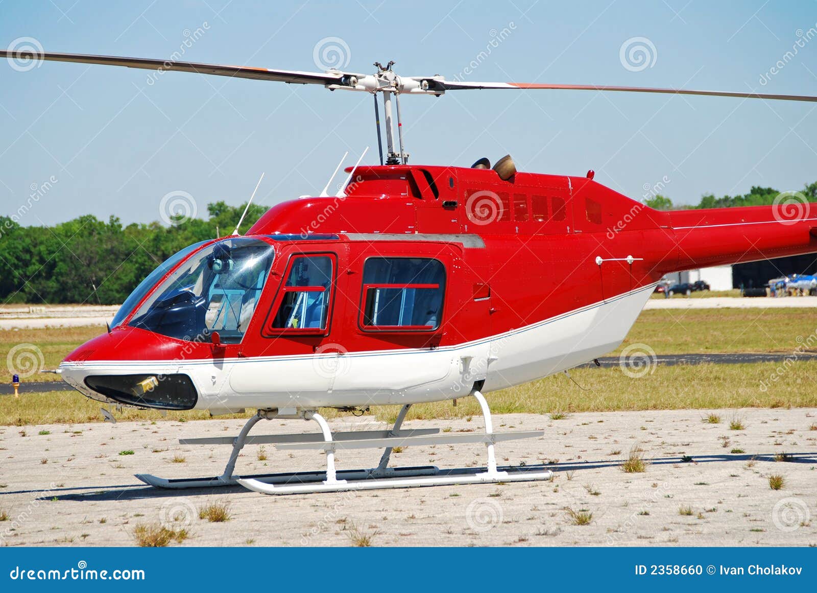Red Helicopter on the Ground Stock Photo - Image of airfield, aircraft ...