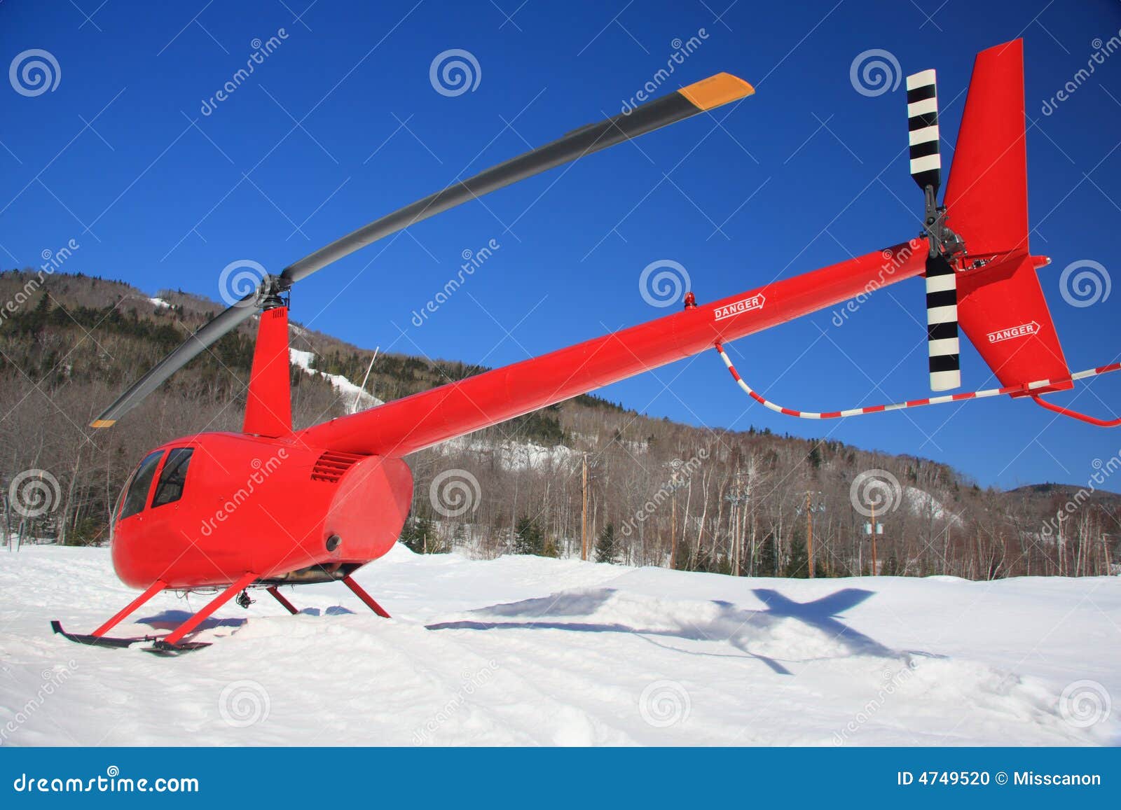 Red helicopter in snow stock photo. Image of rotor, quebec - 4749520