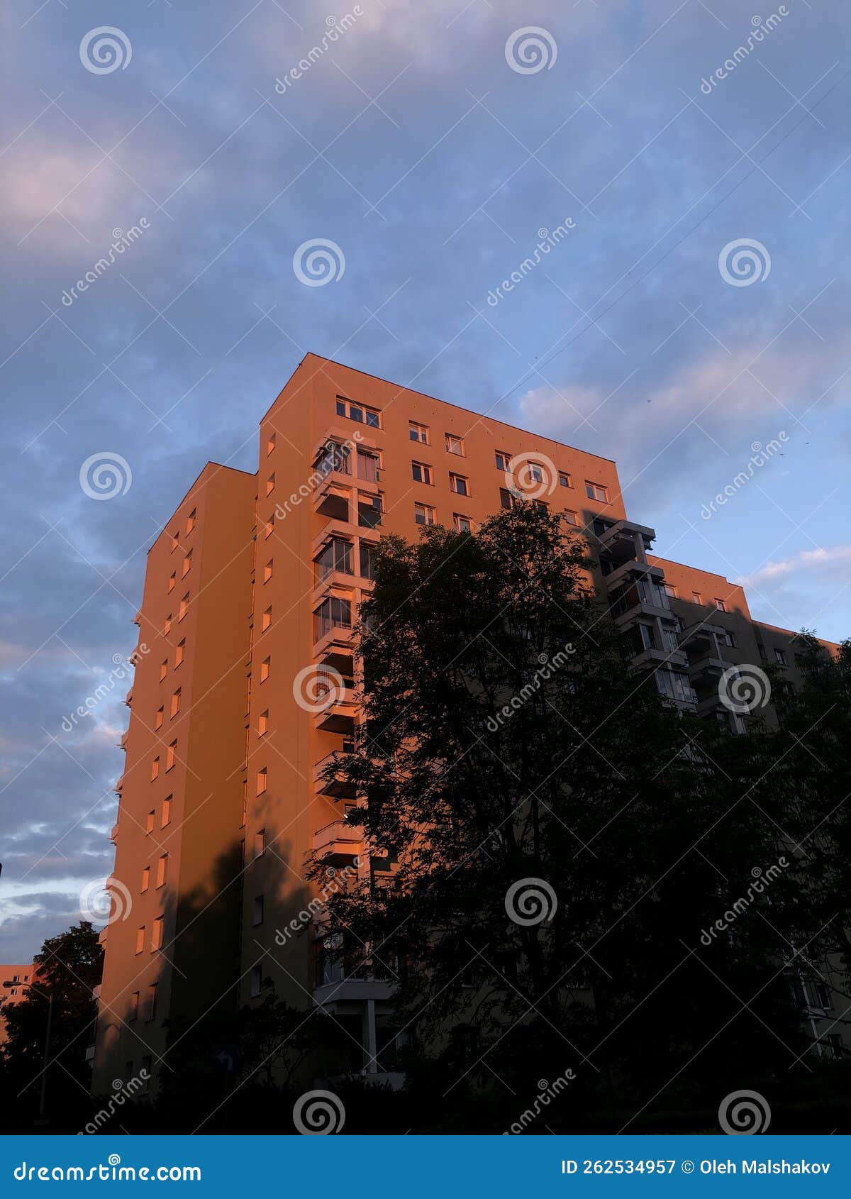 Red High-rise Building on a Background of Blue Sky. Stock Image - Image ...