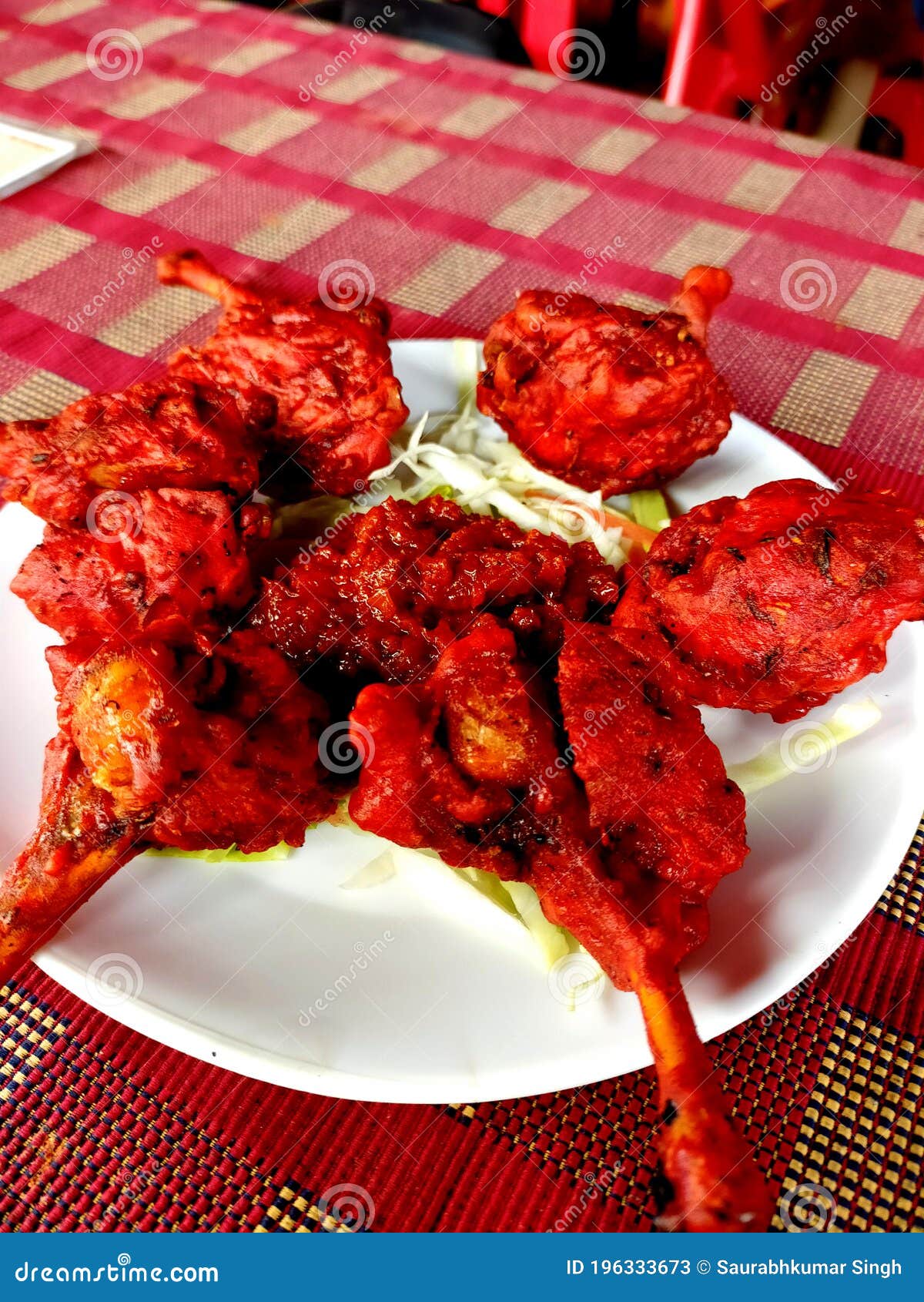 Red Hot Fried Chicken Lollipop with Hot Red Chutney Sauce Stock Image ...