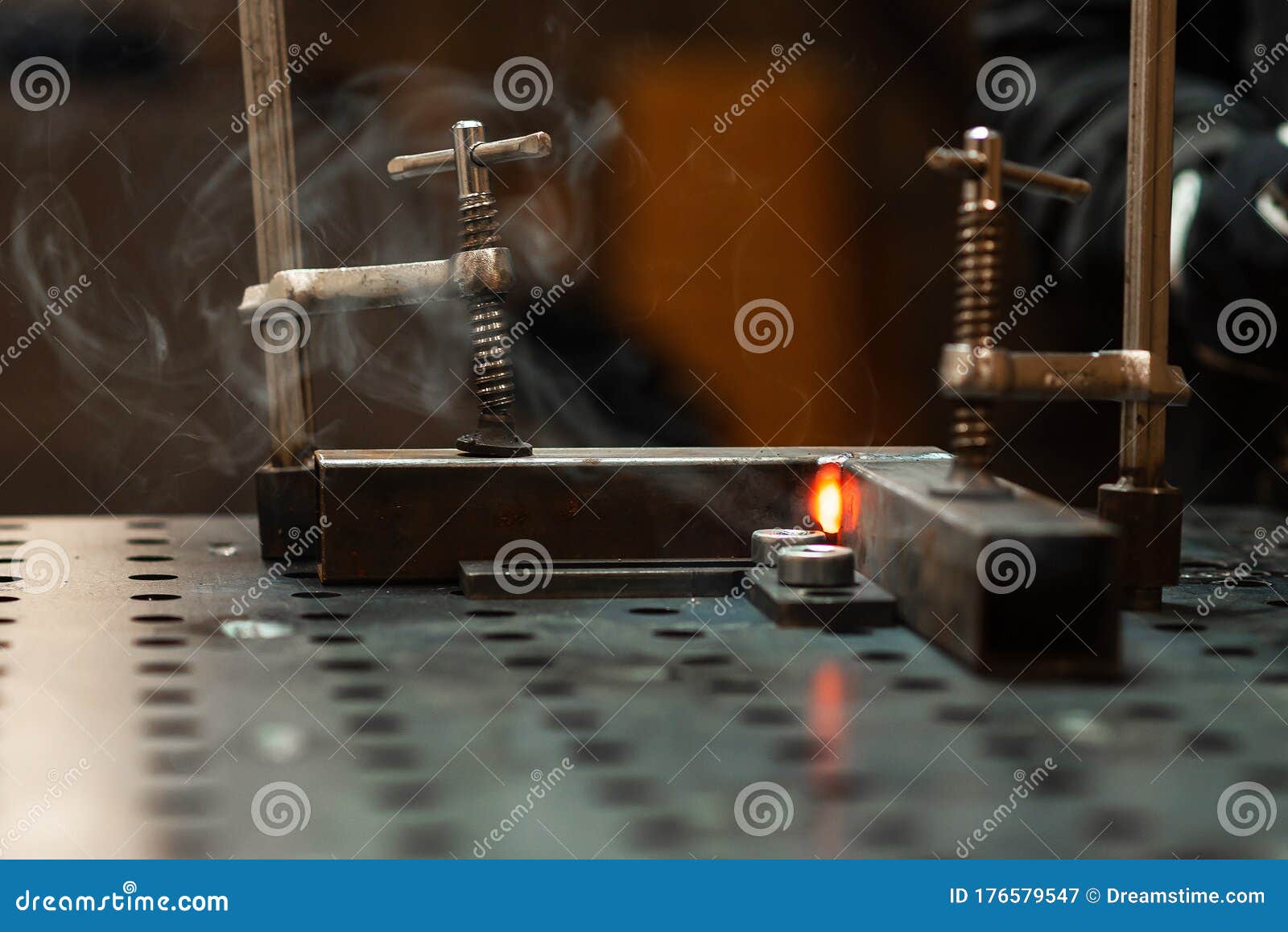 A Red Hot Weld between Two Pieces of a Metal Pipe Cools Down Stock ...