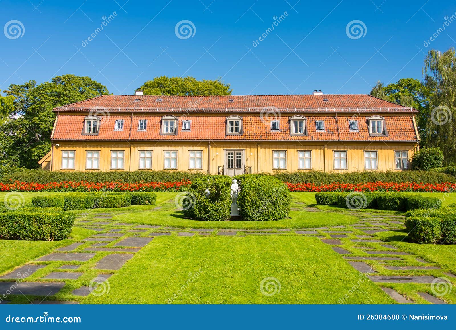 Red house in garden stock photo. Image of landscaping - 26384680