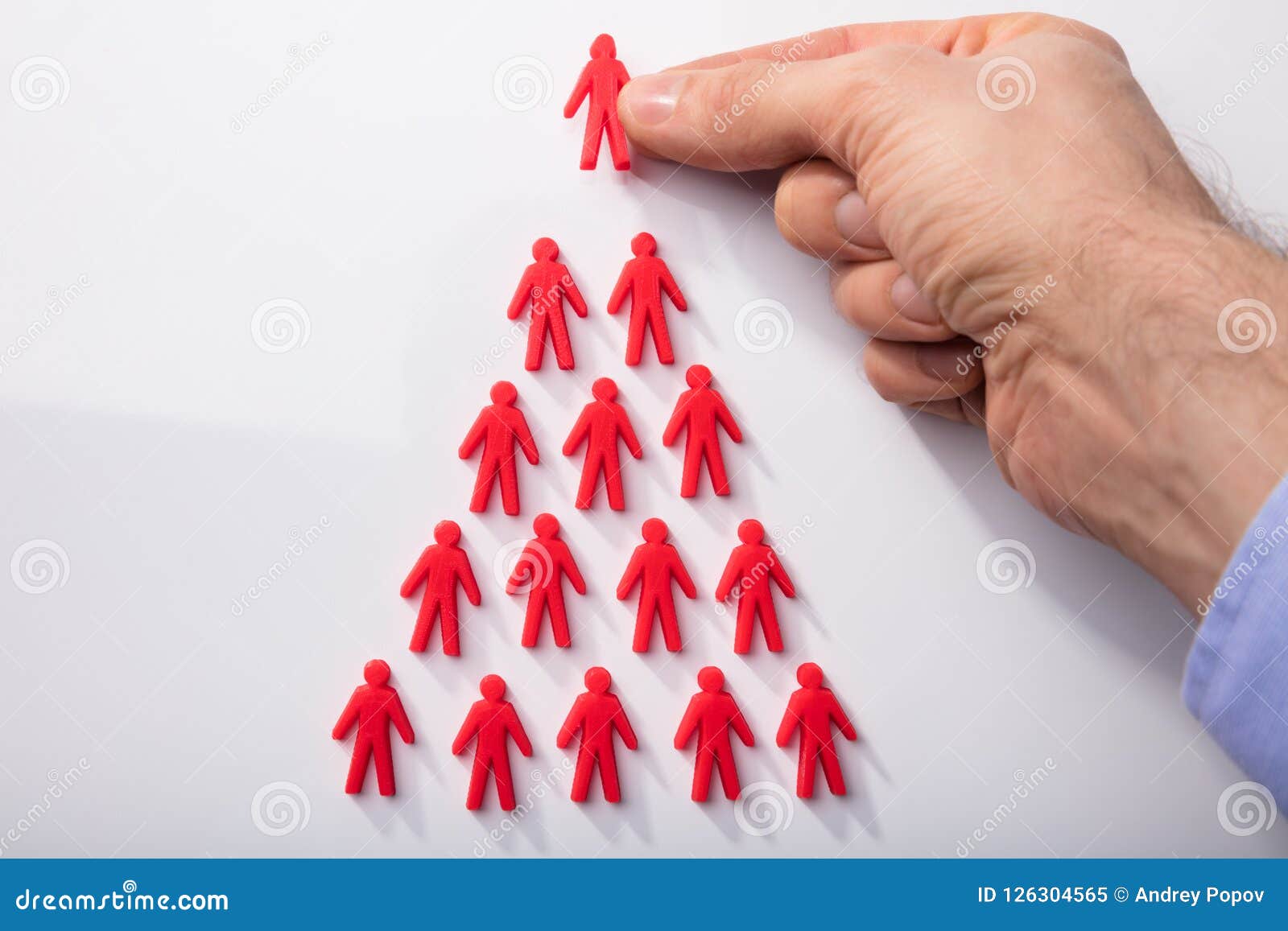 Red Human Figures Arranged in Triangular Shape Stock Image - Image of ...