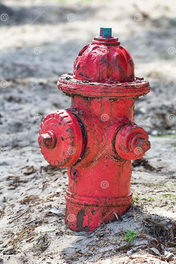 Red hydrant on the beach stock photo. Image of machine - 299443330